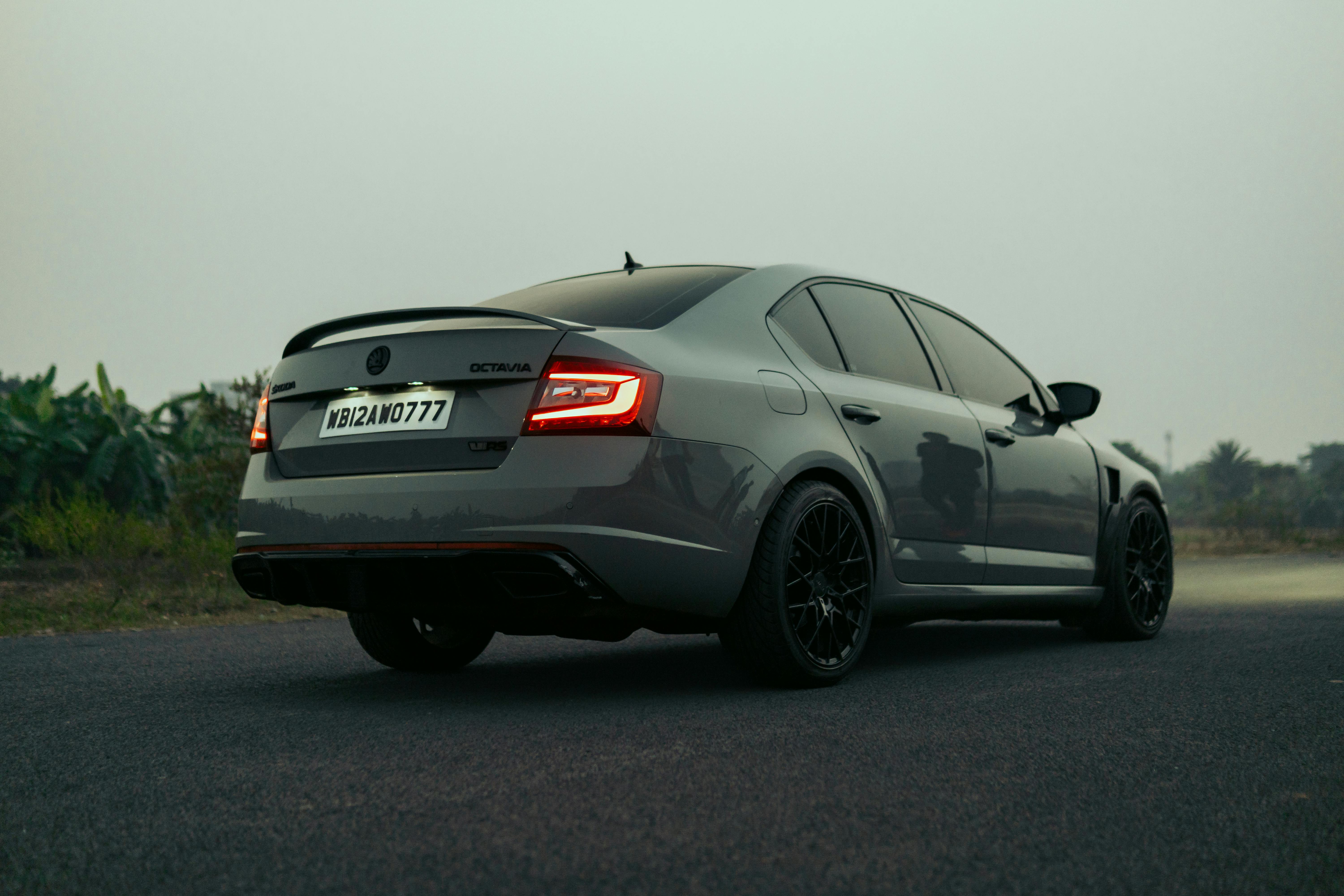 A Gray Skoda Octavia on an Asphalt Road · Free Stock Photo