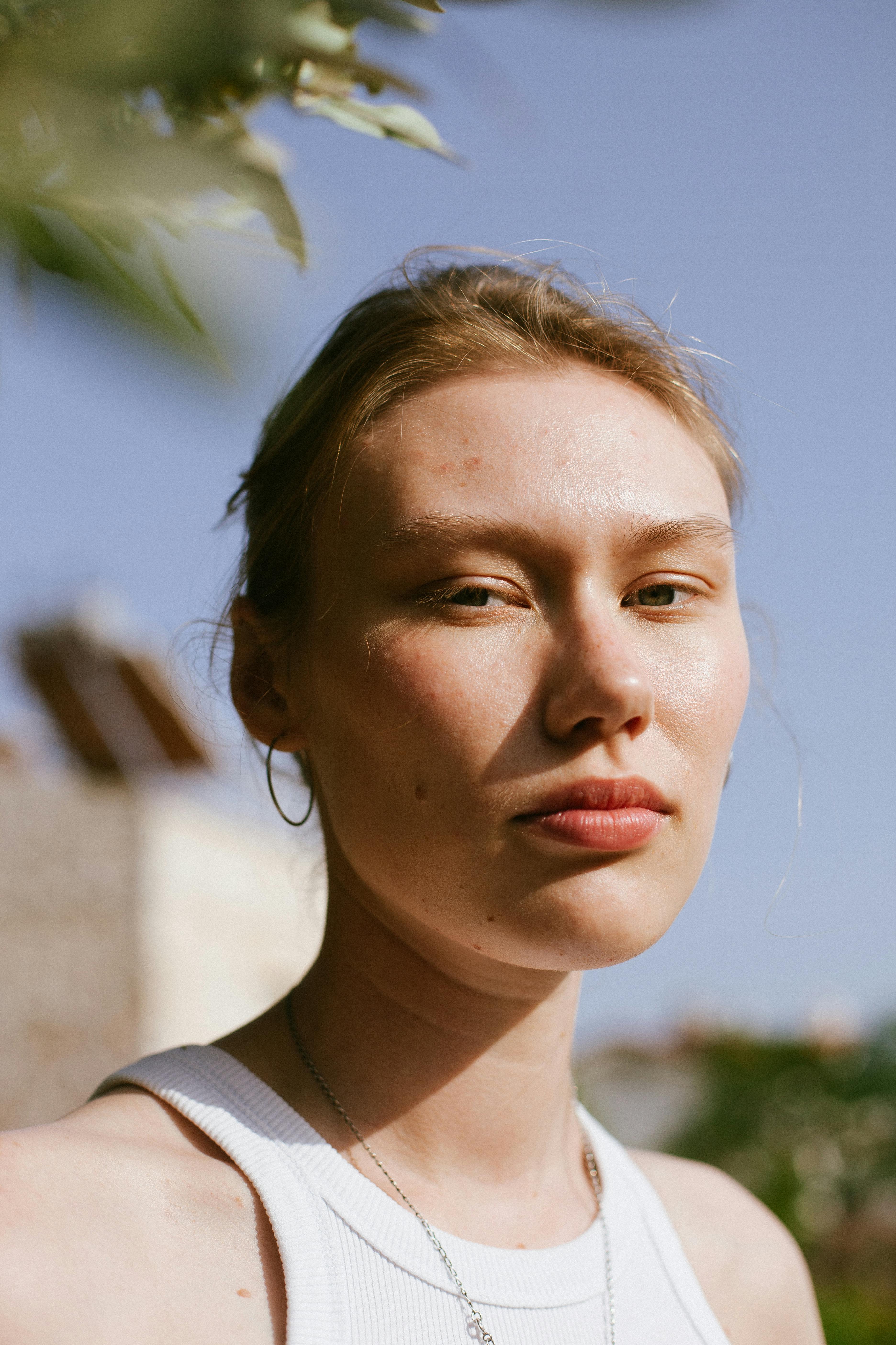 Sunlit Face of Woman · Free Stock Photo