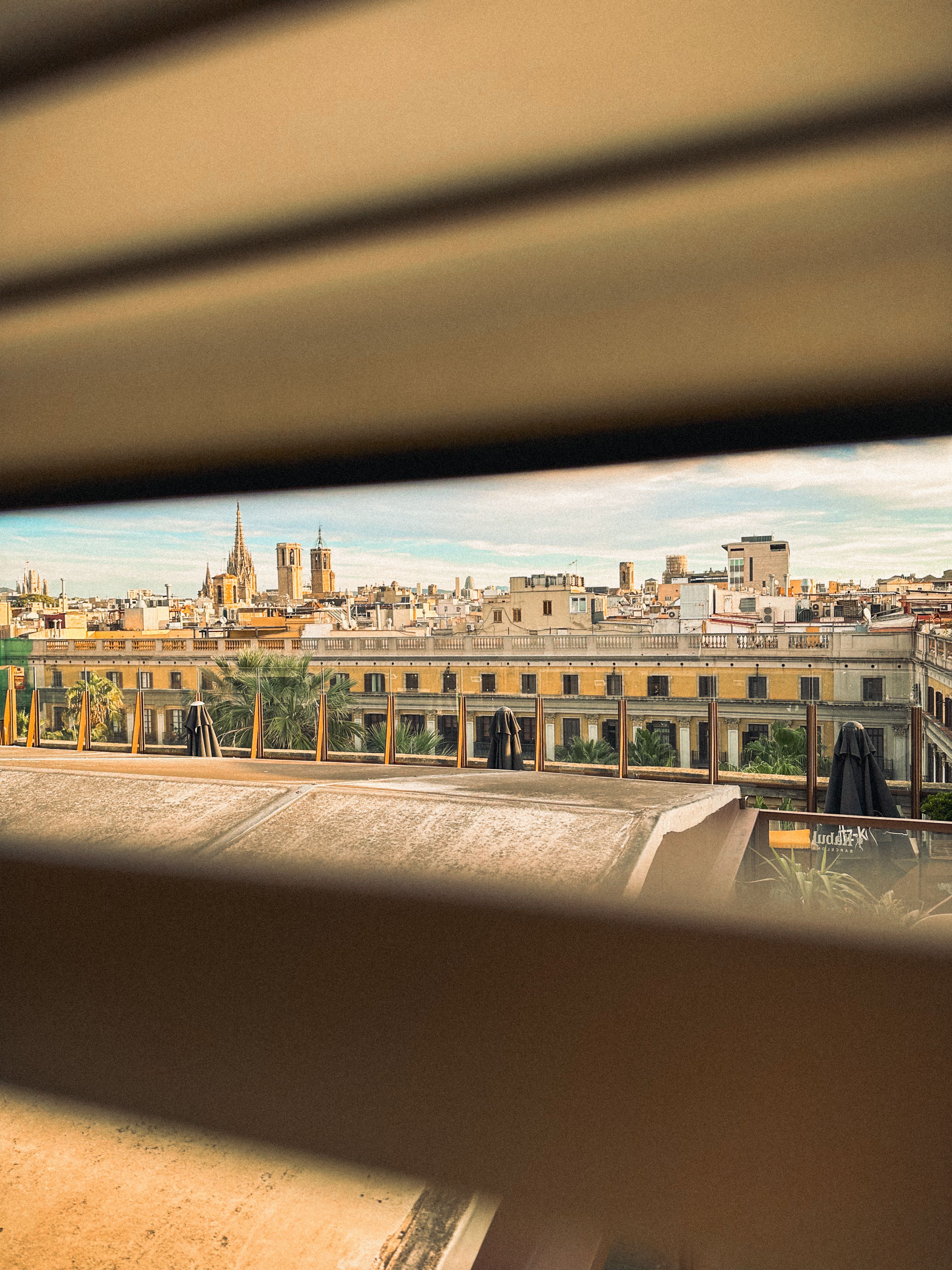 A City Seen Through a Window · Free Stock Photo