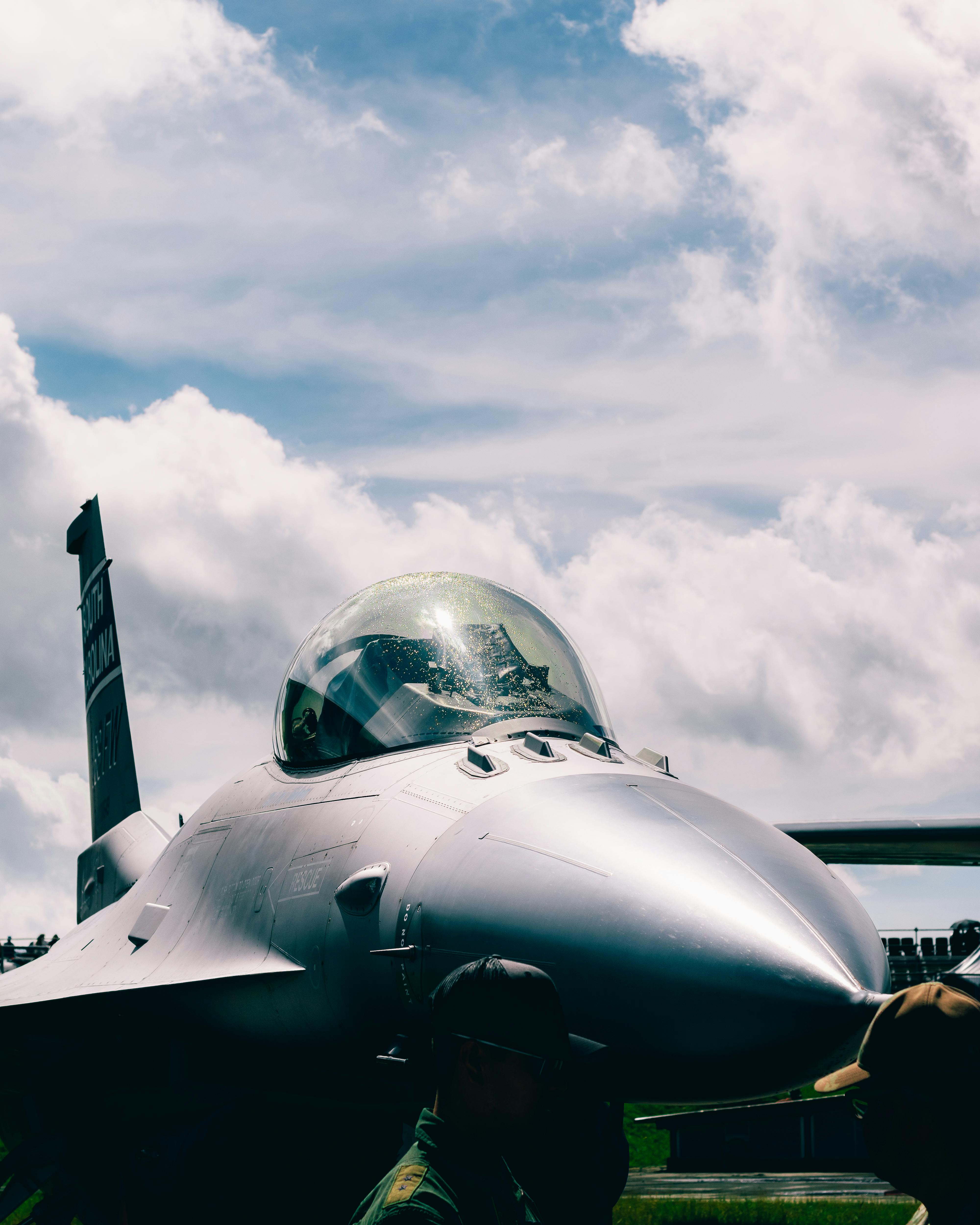 Military Jet Flying in Blue Sky · Free Stock Photo