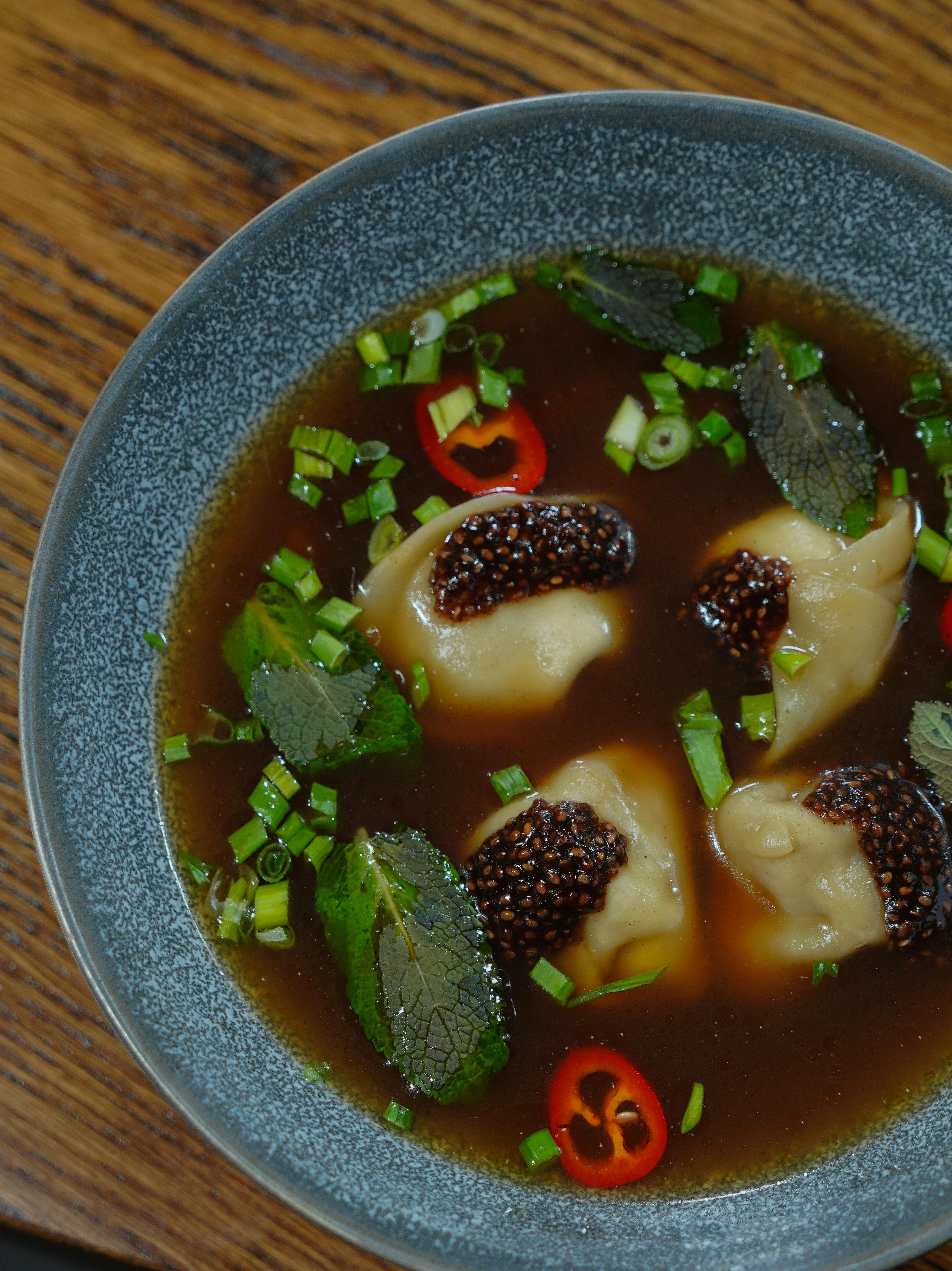 An Animation of Spilled Soup on a Yellow Background · Free Stock Photo