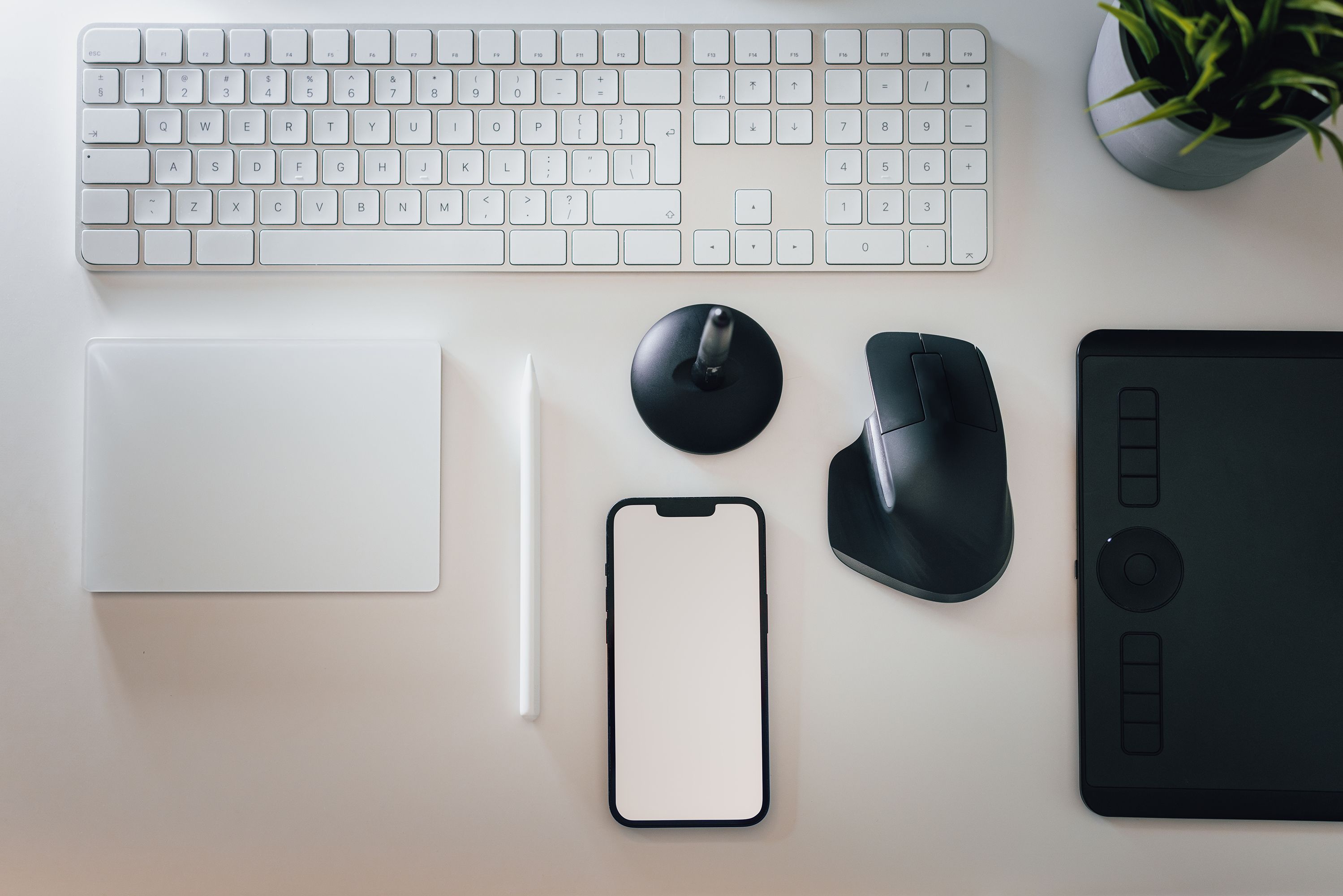 Top View of Electronics Lying on a Desk · Free Stock Photo