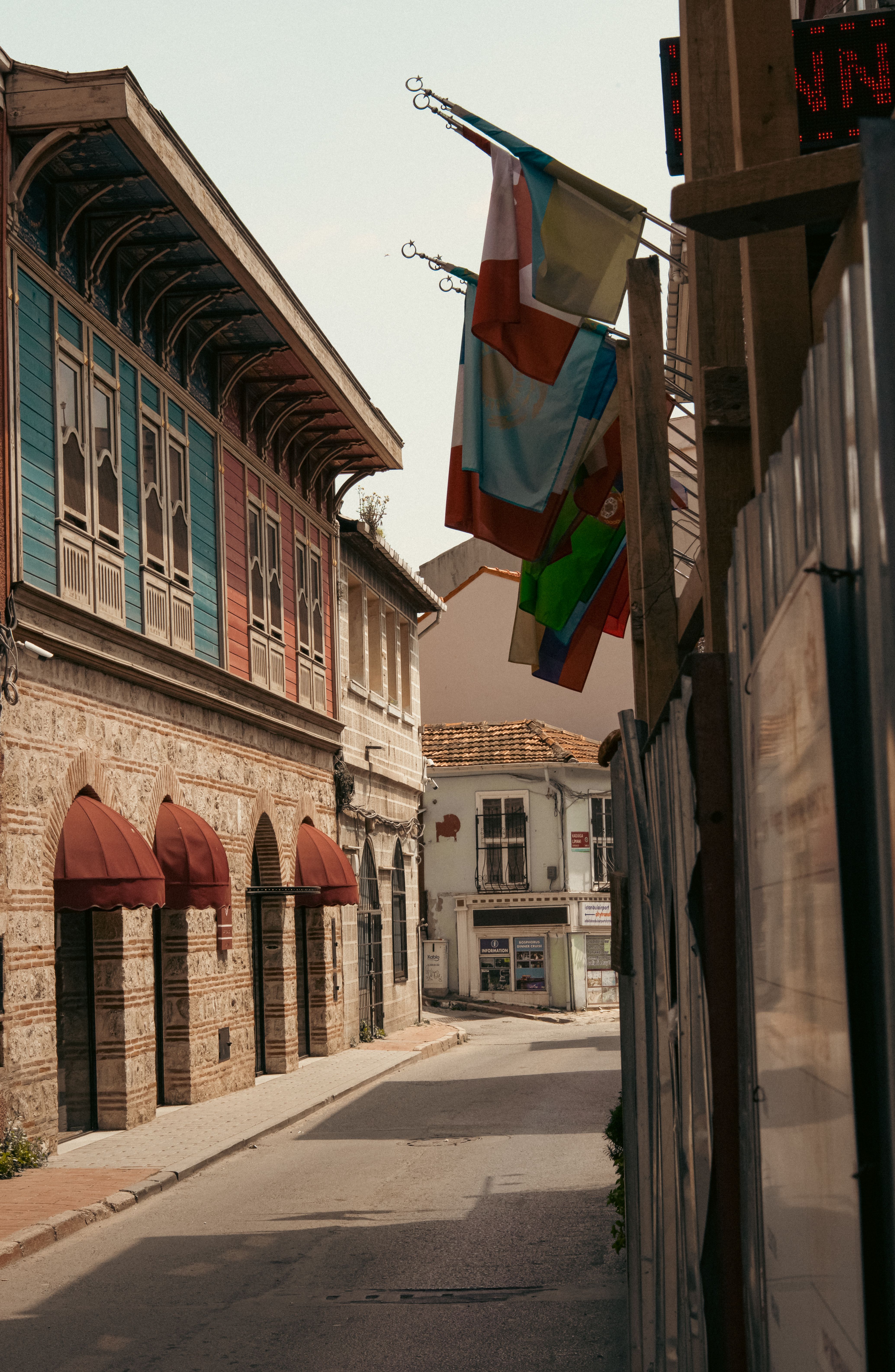 Flags over Street in Town · Free Stock Photo