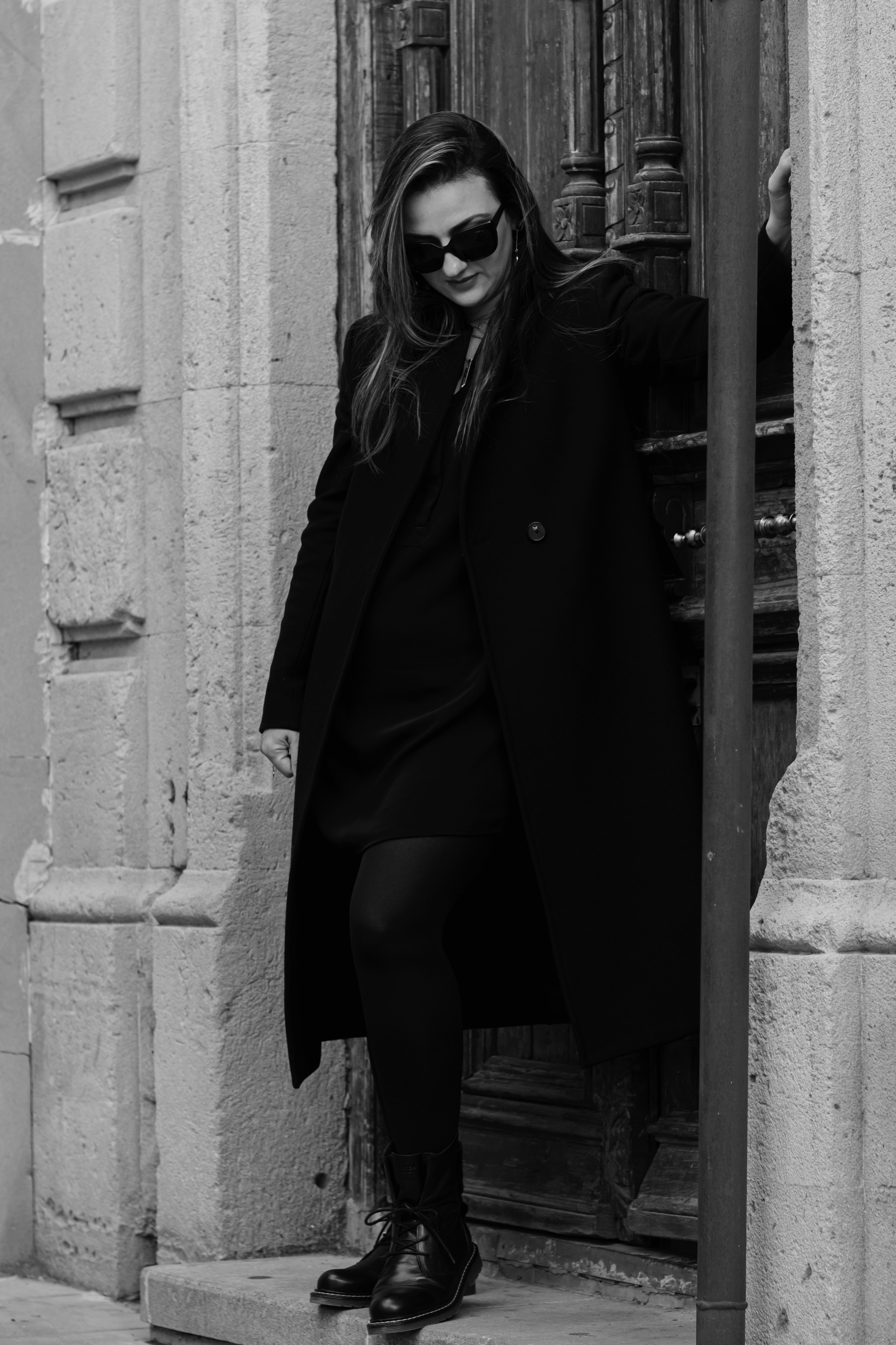Tourist on the Threshold of a Historic Church · Free Stock Photo