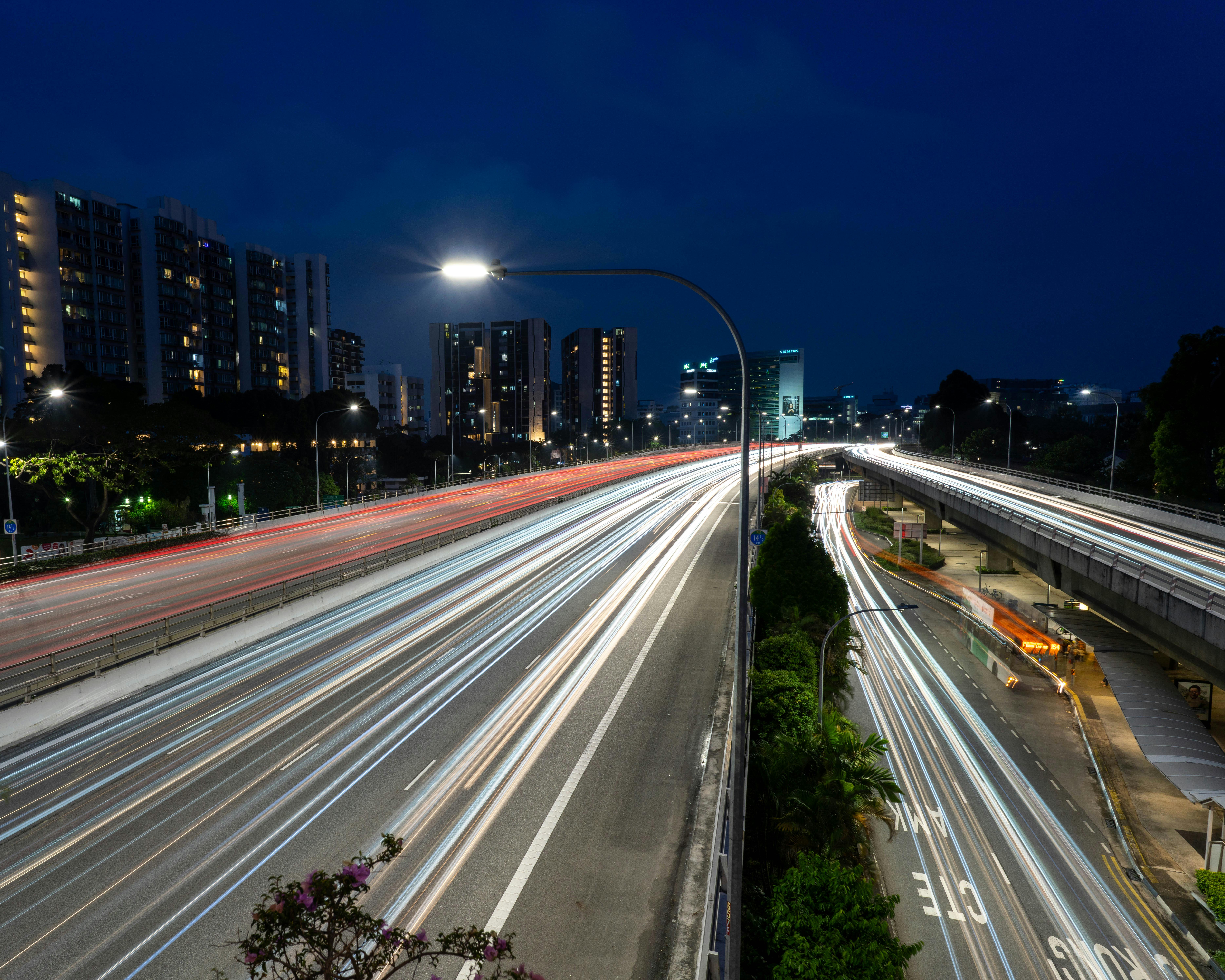 Empty Illuminated Highway at Night · Free Stock Photo