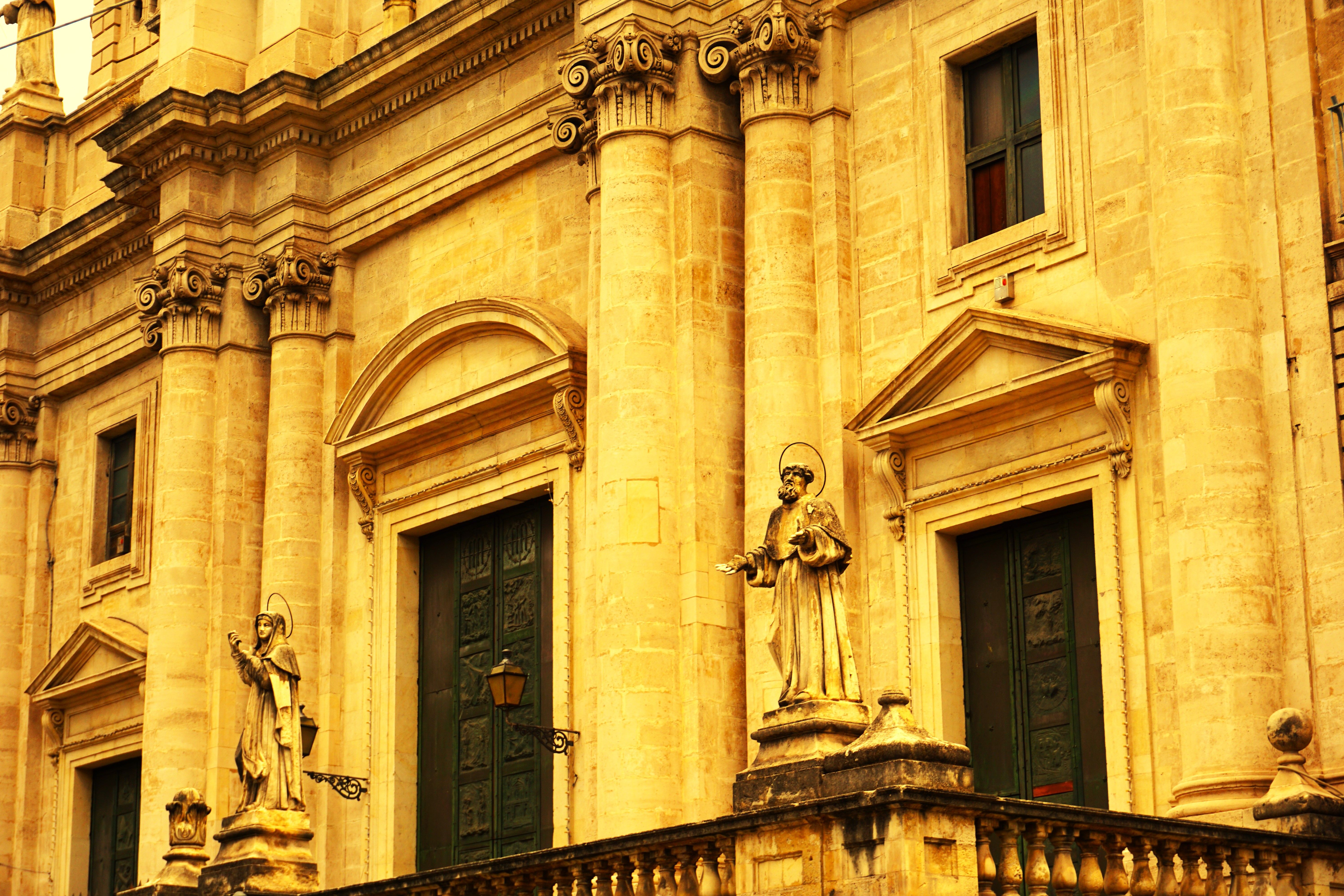 Statues on Church Wall · Free Stock Photo