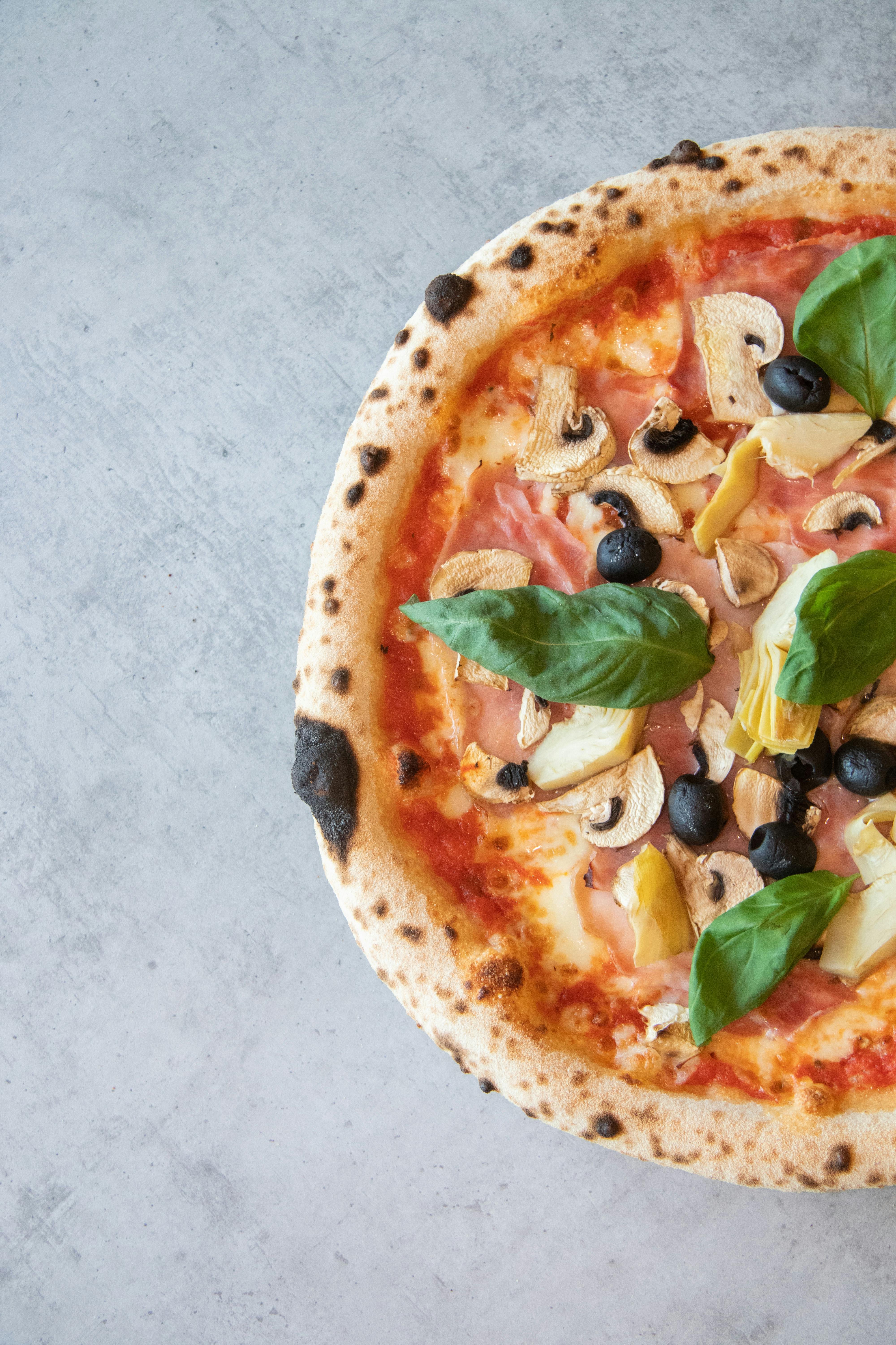 Hand Holding Pizza · Free Stock Photo