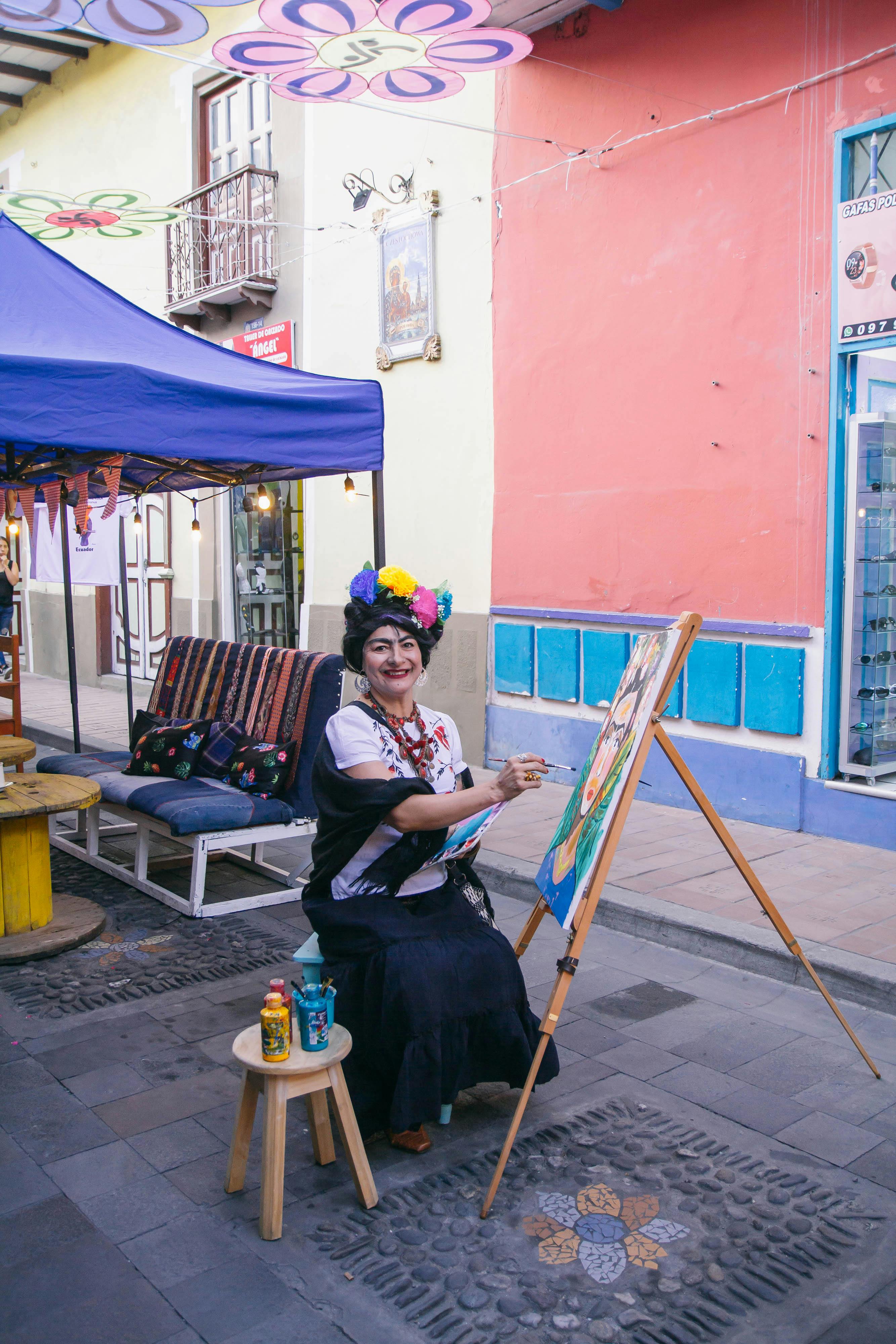 Smiling Artist Painting on Canvas on Street · Free Stock Photo