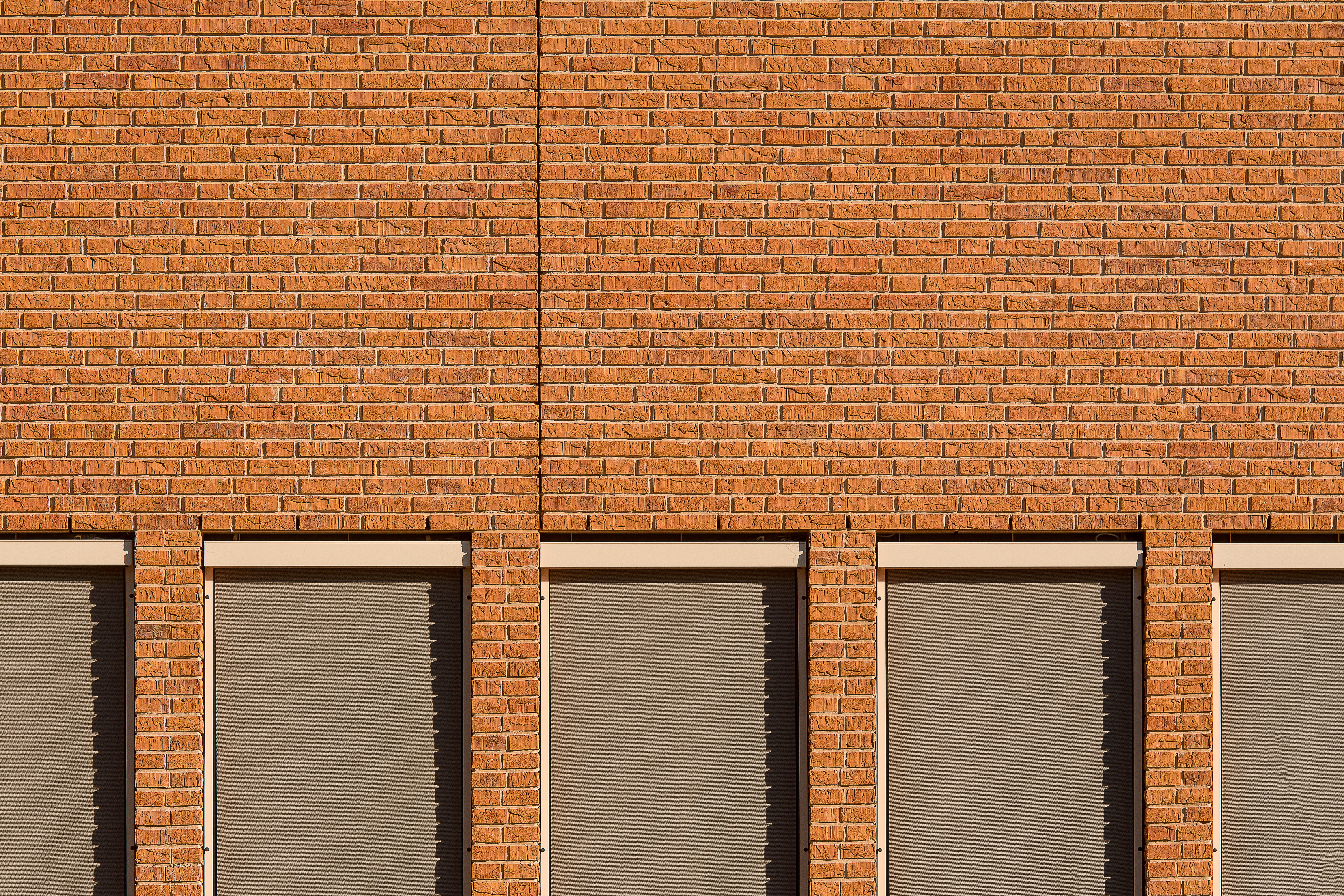 Windows in Brick Wall · Free Stock Photo