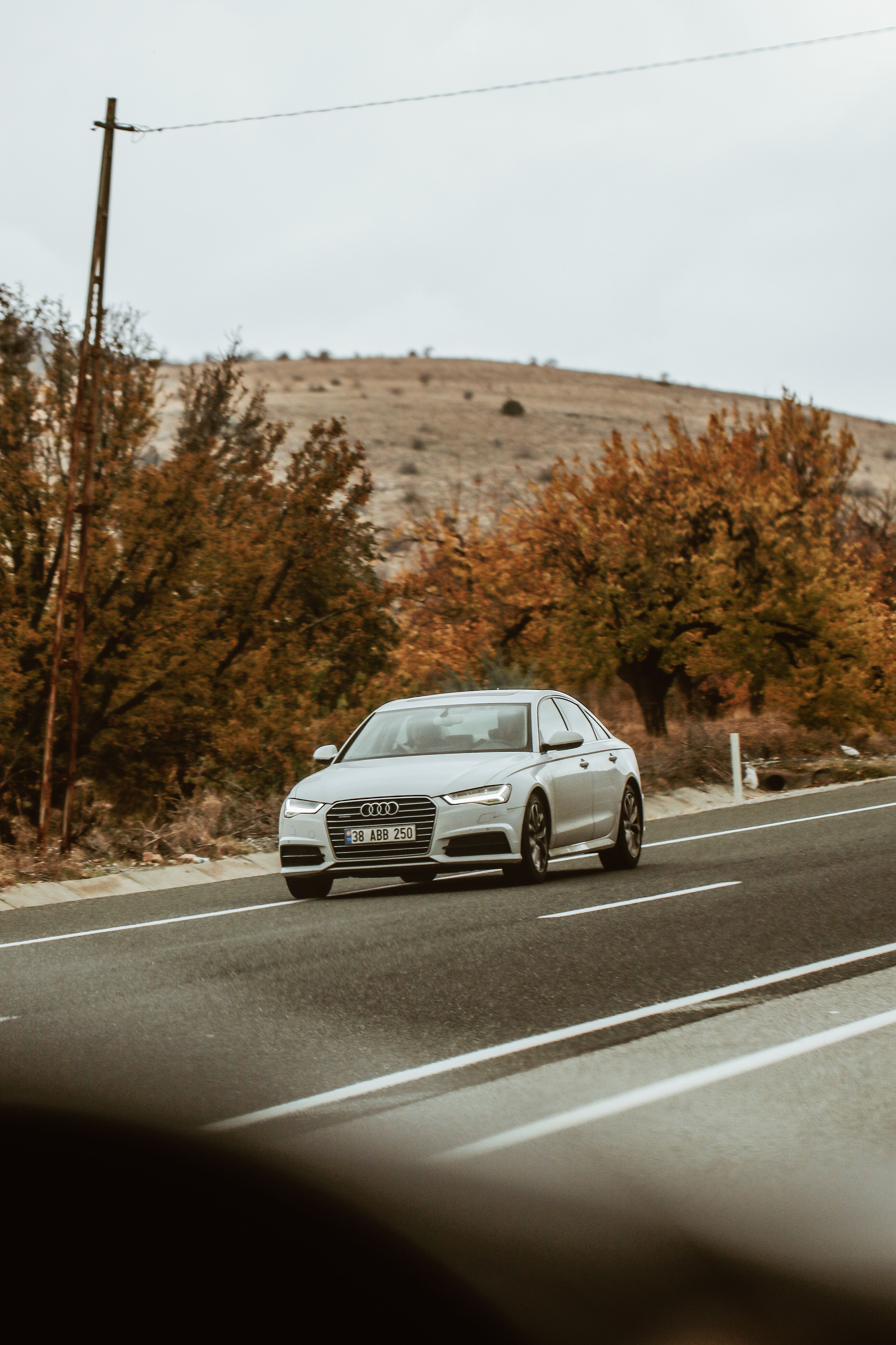 White BMW Car Driving on the Road · Free Stock Photo