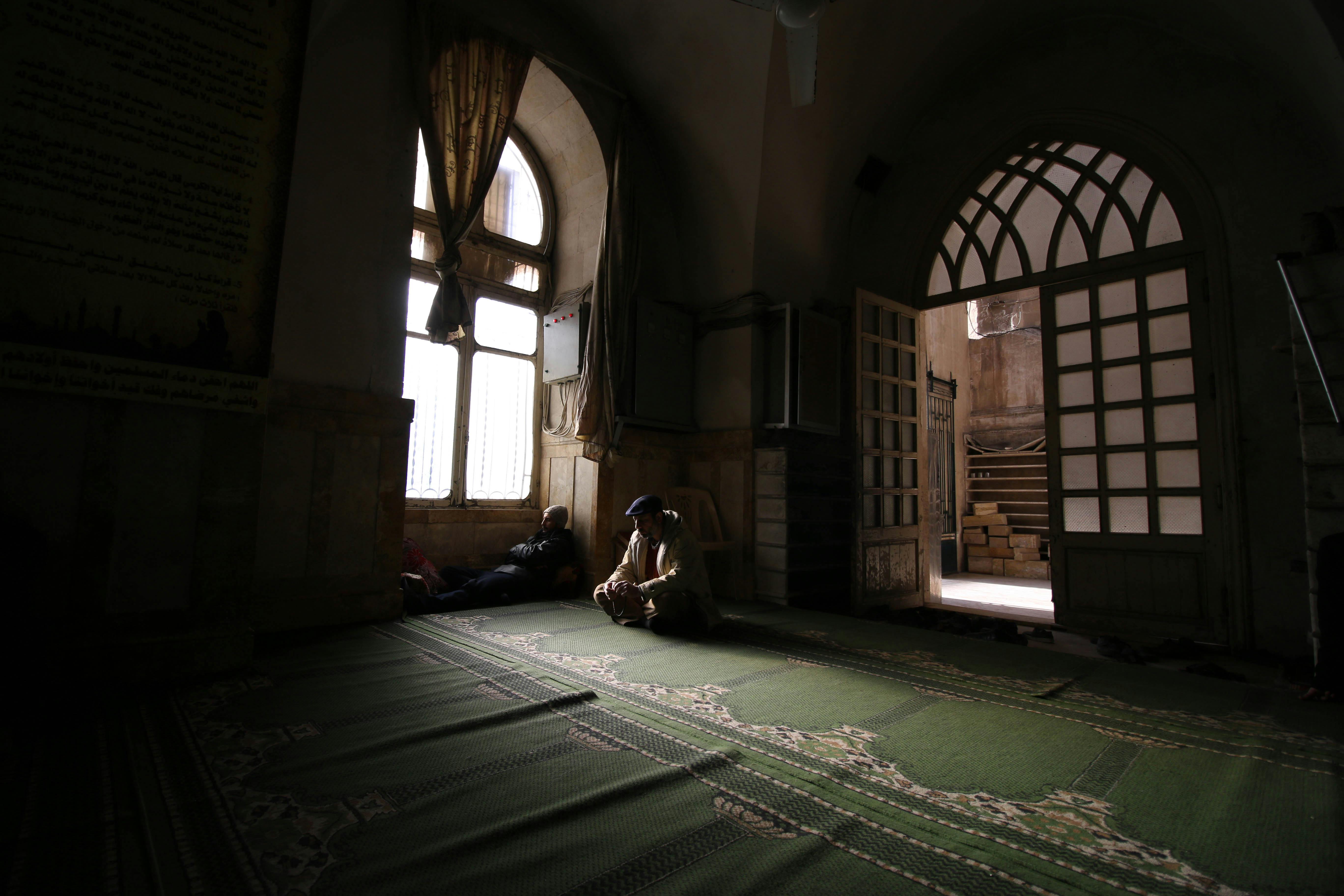 Men Sitting in a Mosque · Free Stock Photo