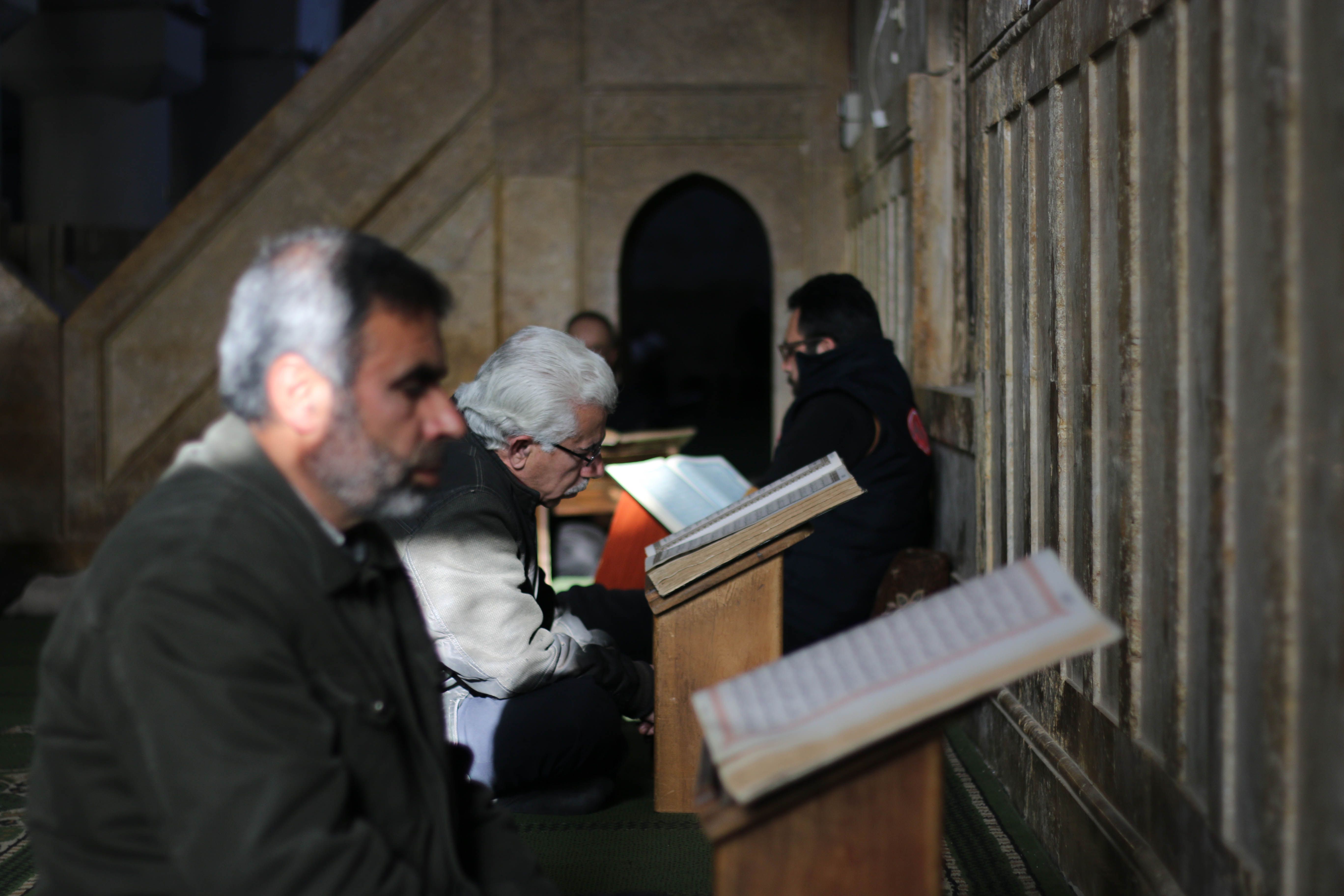Men Reading Books in a Mosque · Free Stock Photo