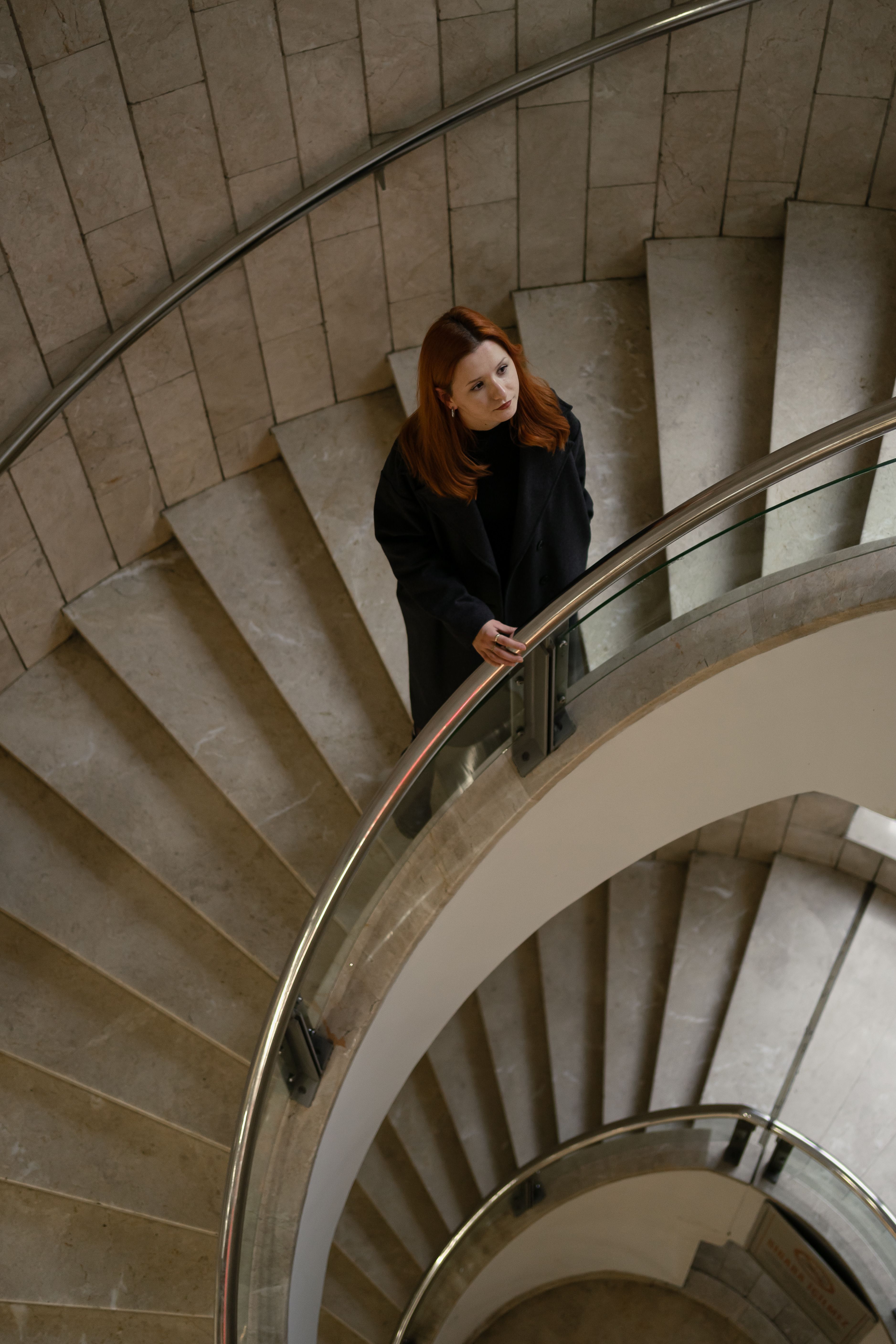 Woman Standing on Stairs · Free Stock Photo