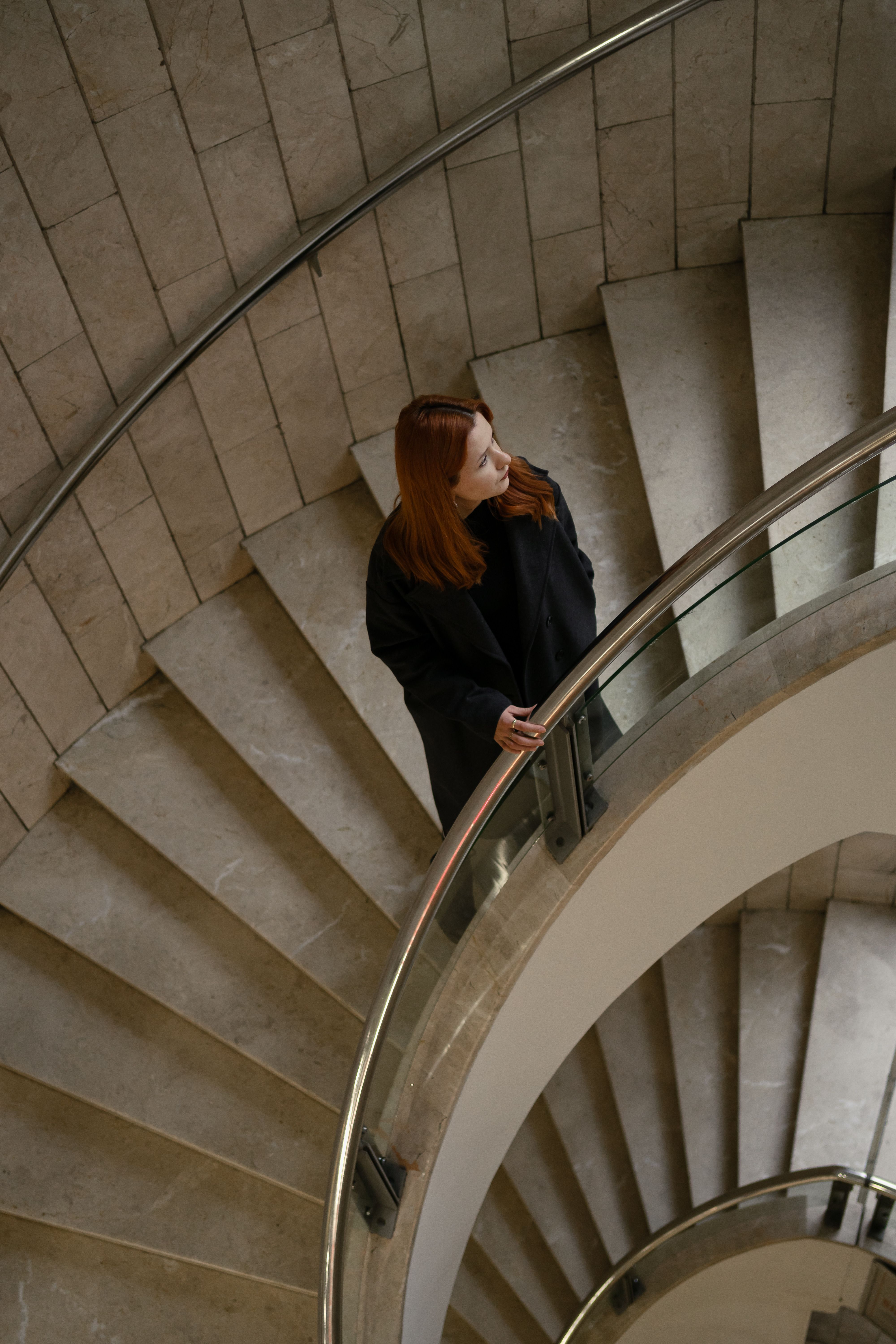 Woman Standing on Stairs · Free Stock Photo