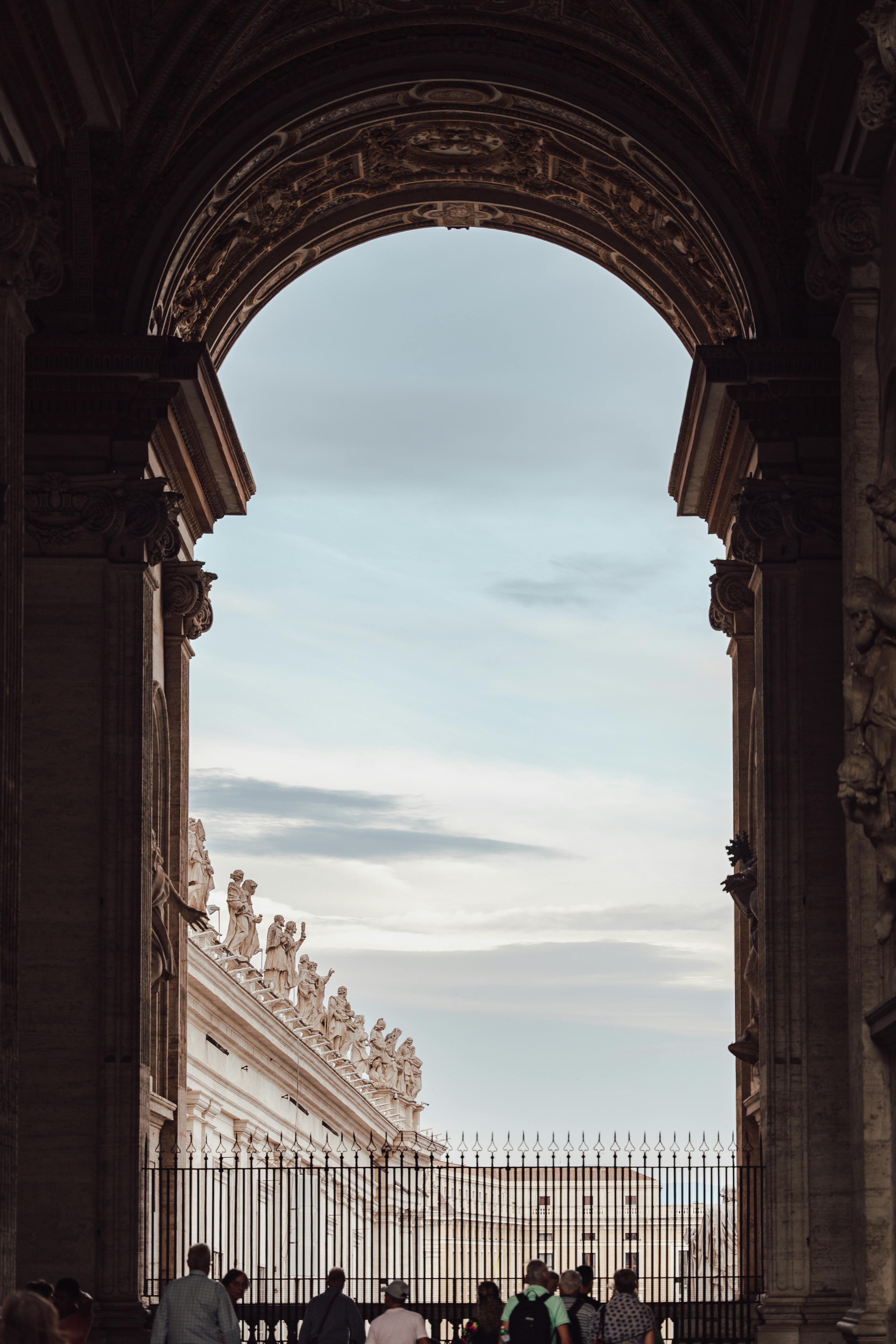 Fence and Wall of St Peters Basilica behind · Free Stock Photo