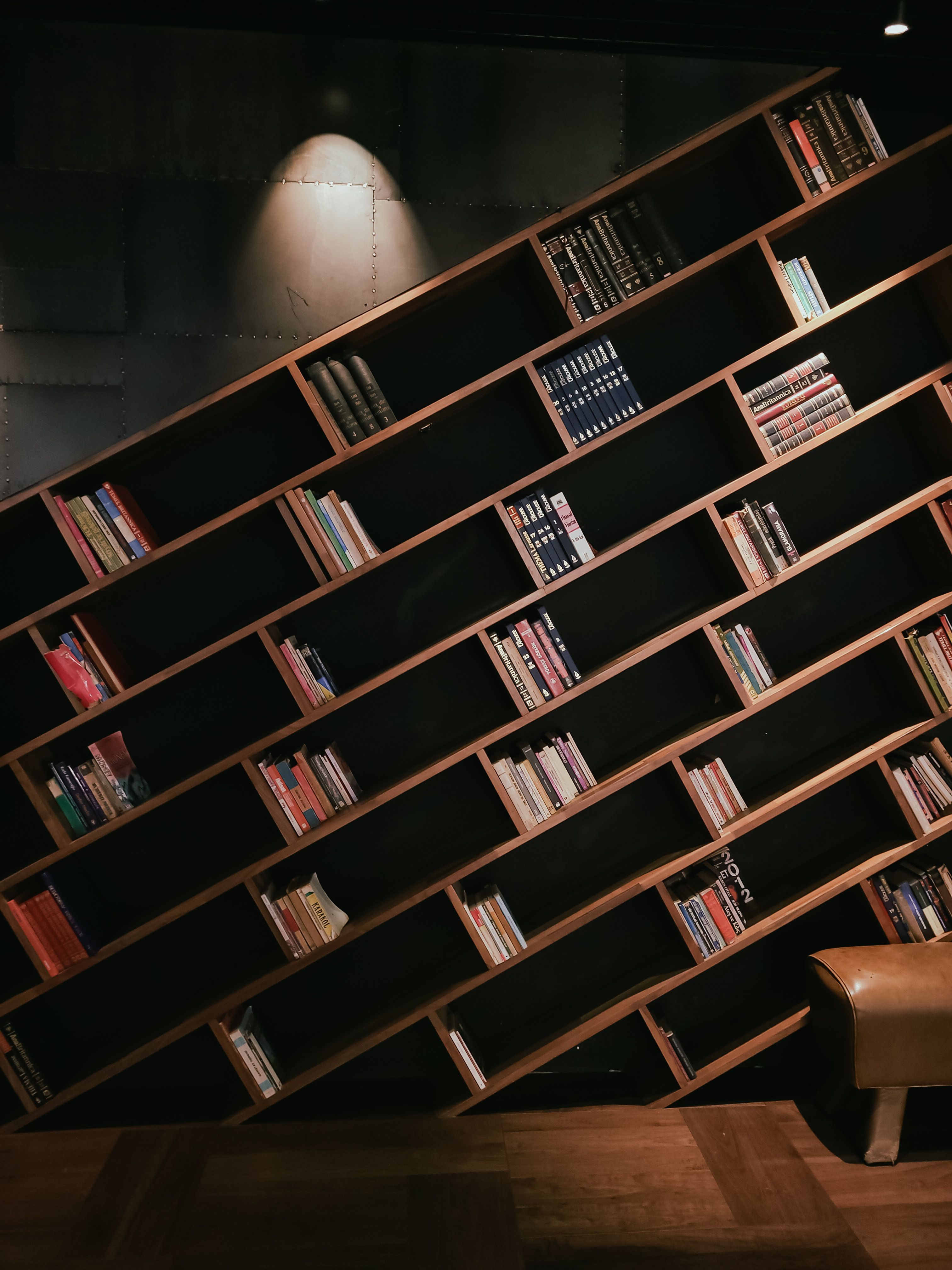 Books on a Shelf in a Library · Free Stock Photo