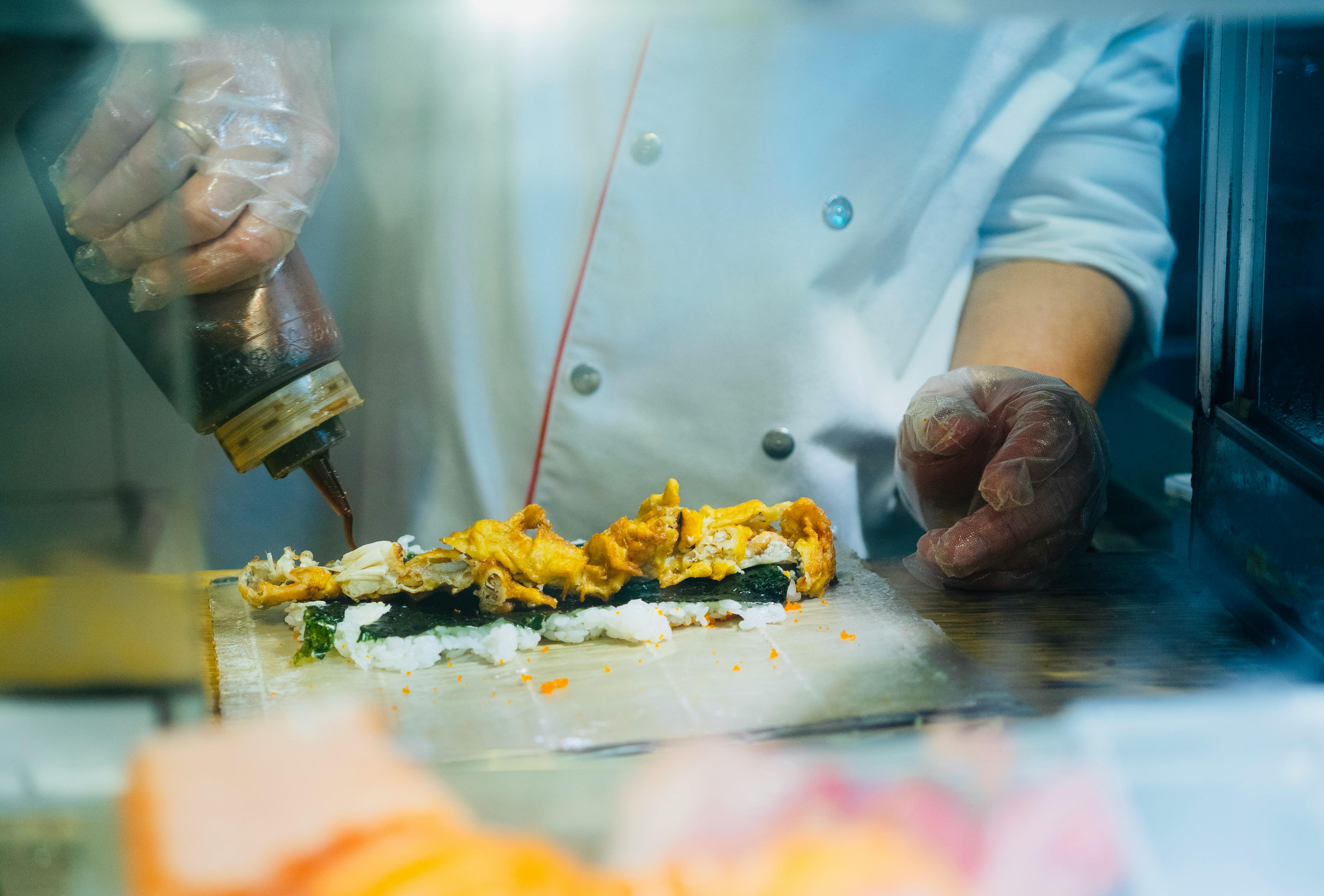 Cooks Hands in Gloves over Food · Free Stock Photo