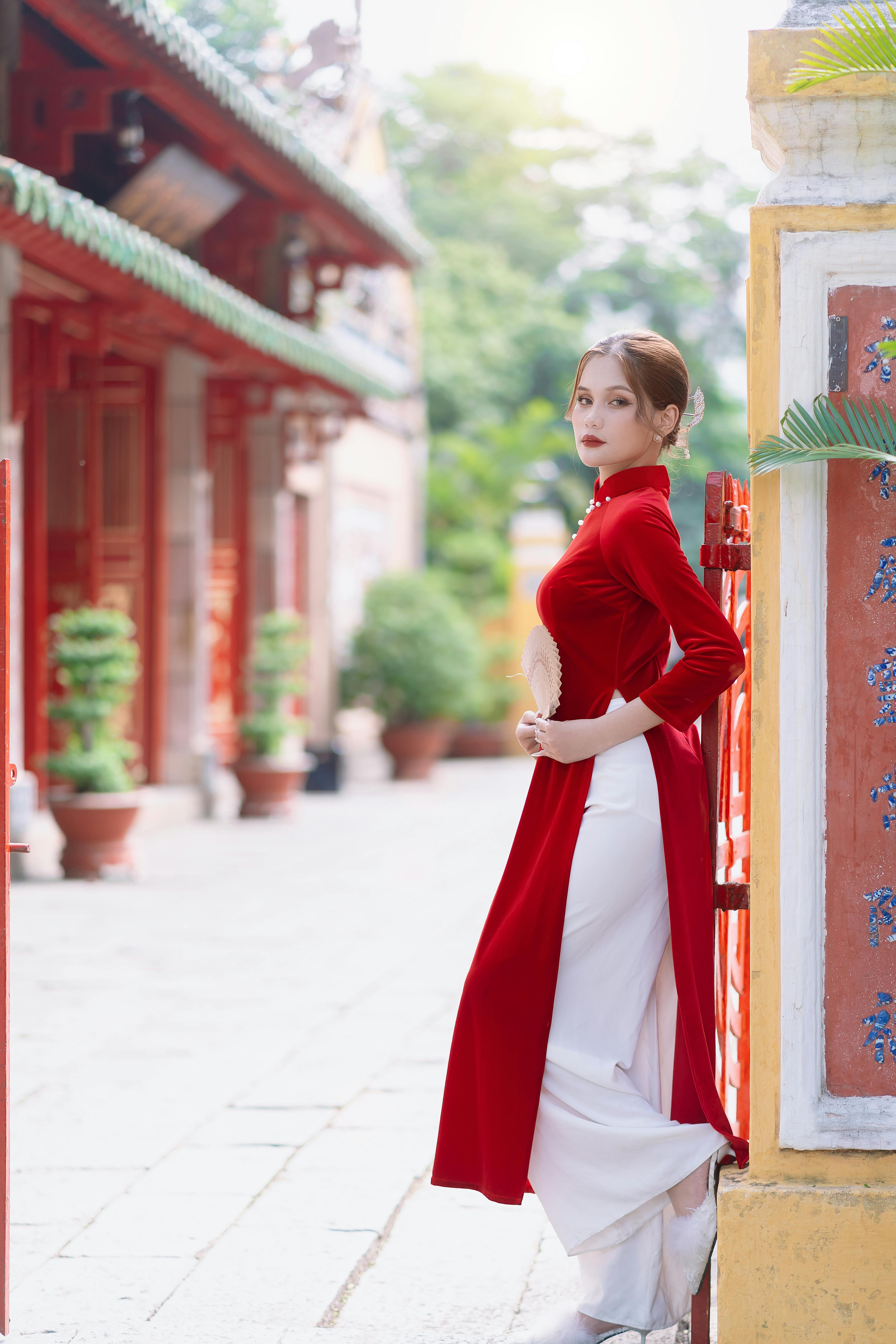 Model Posing in Red Dress · Free Stock Photo