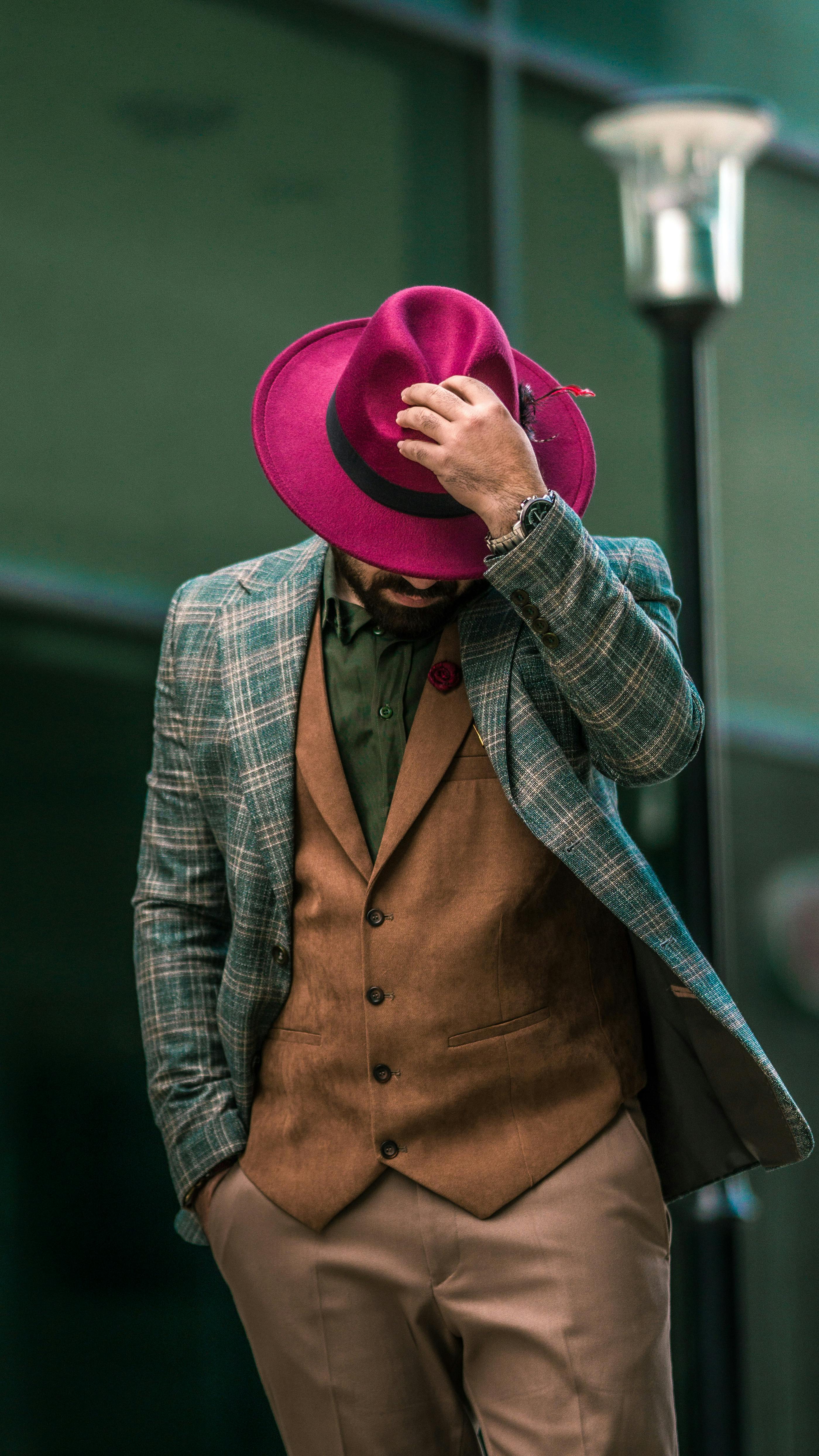 man standing in red fedora hat · Free Stock Photo