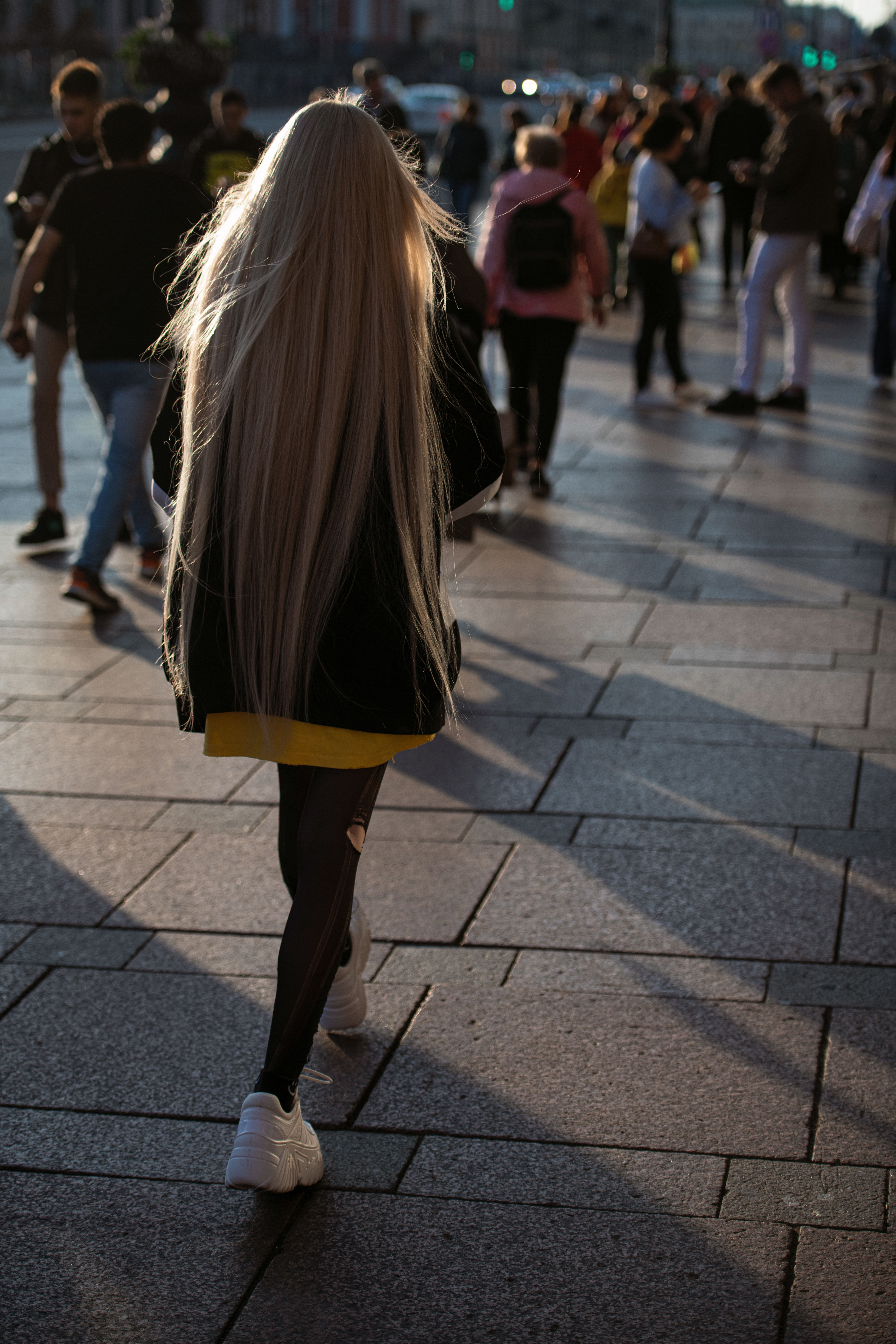Back View of a Blonde with Long Hair, Walking on a Pavement · Free ...