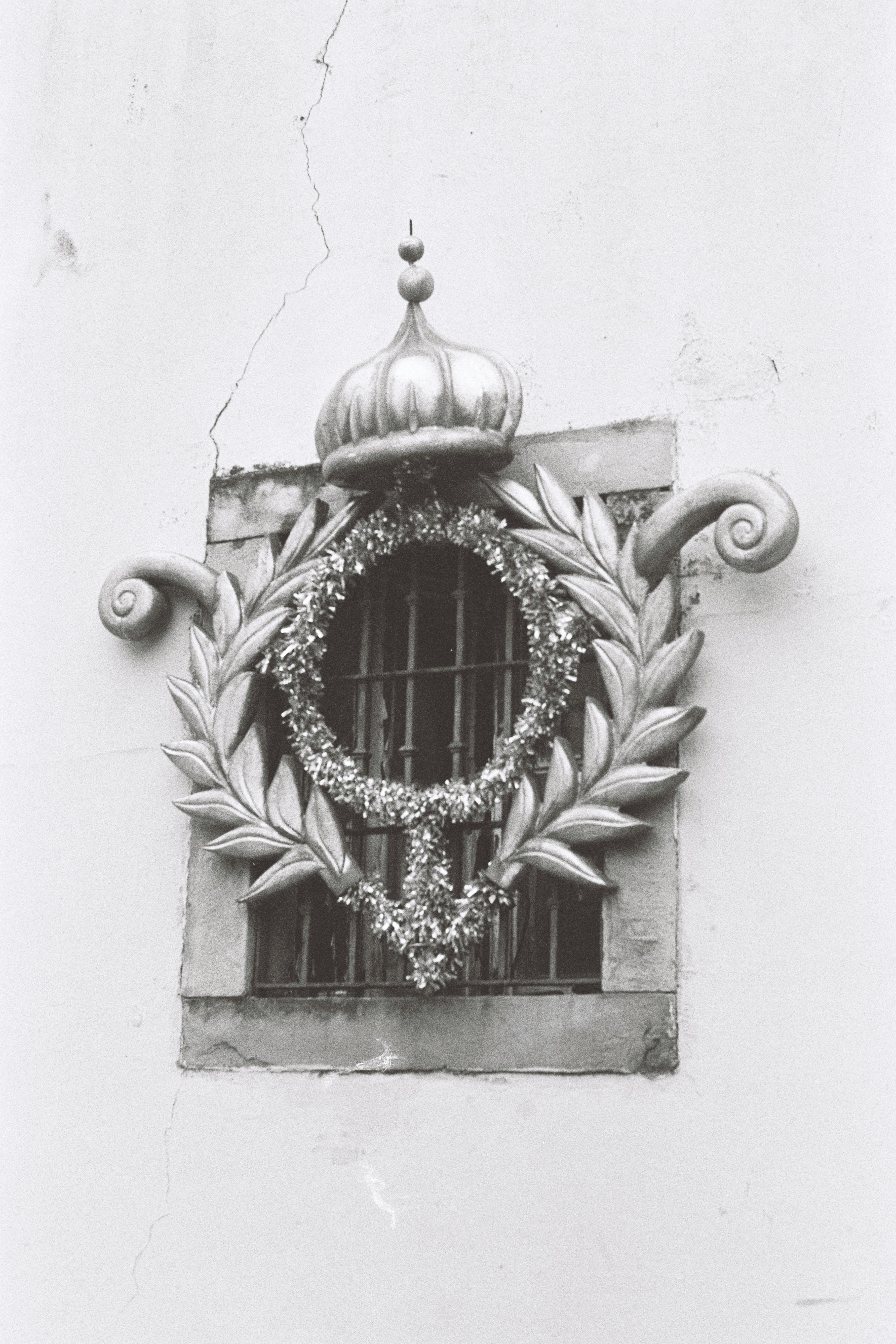 Black and White Photo of a Vintage Barred Window with a Decoration ...