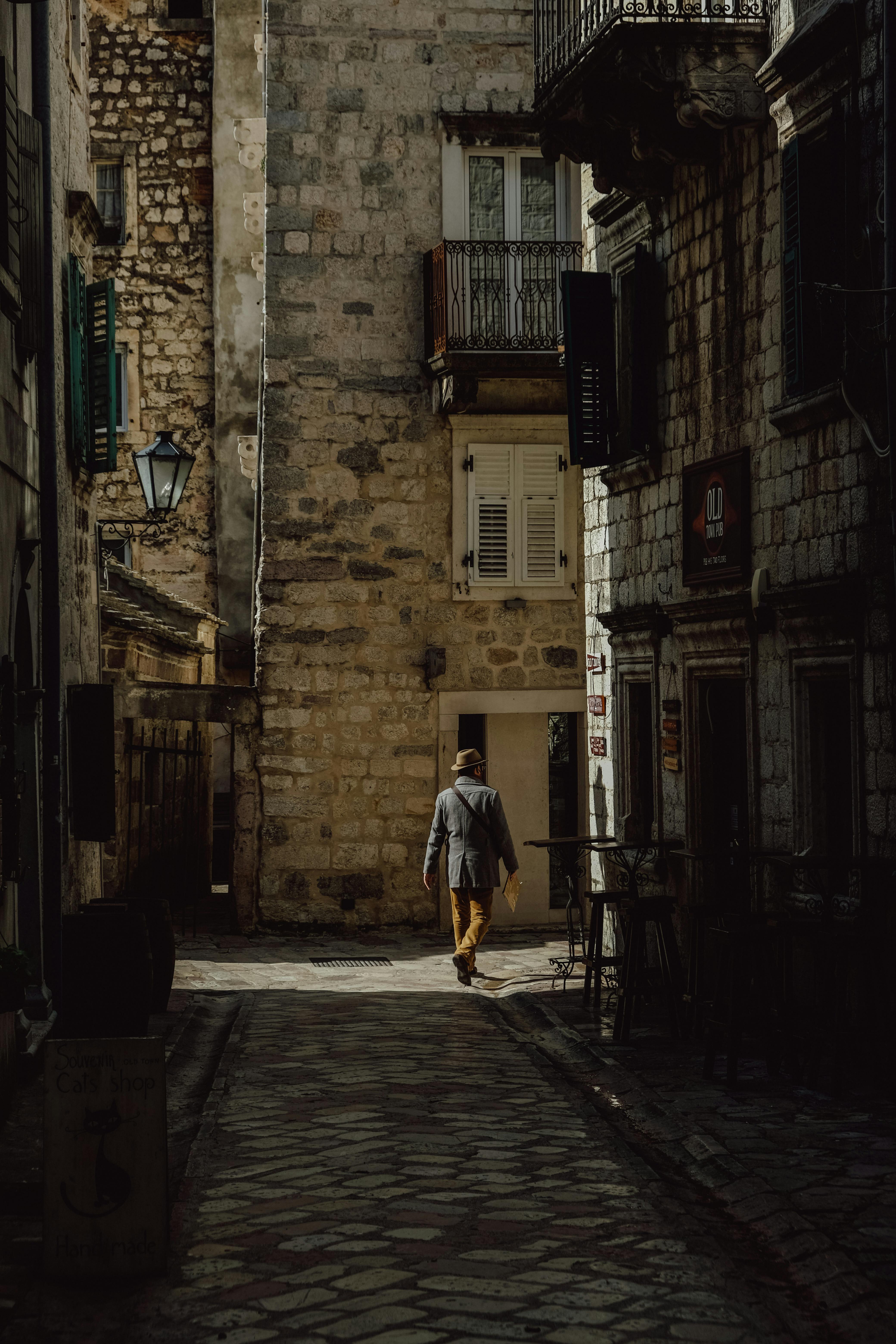 Shady Alley Between Medieval Stone Houses · Free Stock Photo