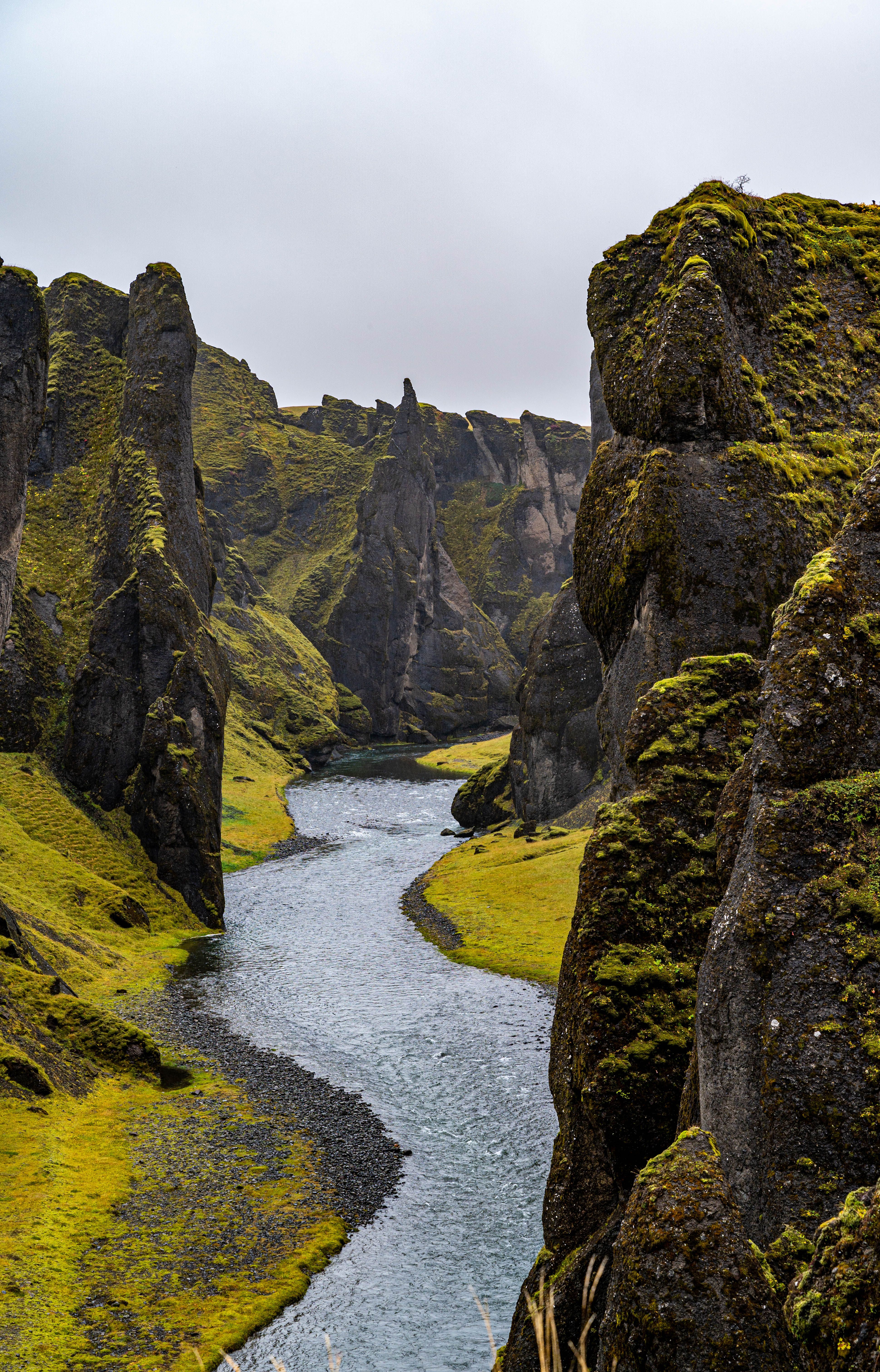 Stone riverbed of river in rocky canyon at daytime · Free Stock Photo
