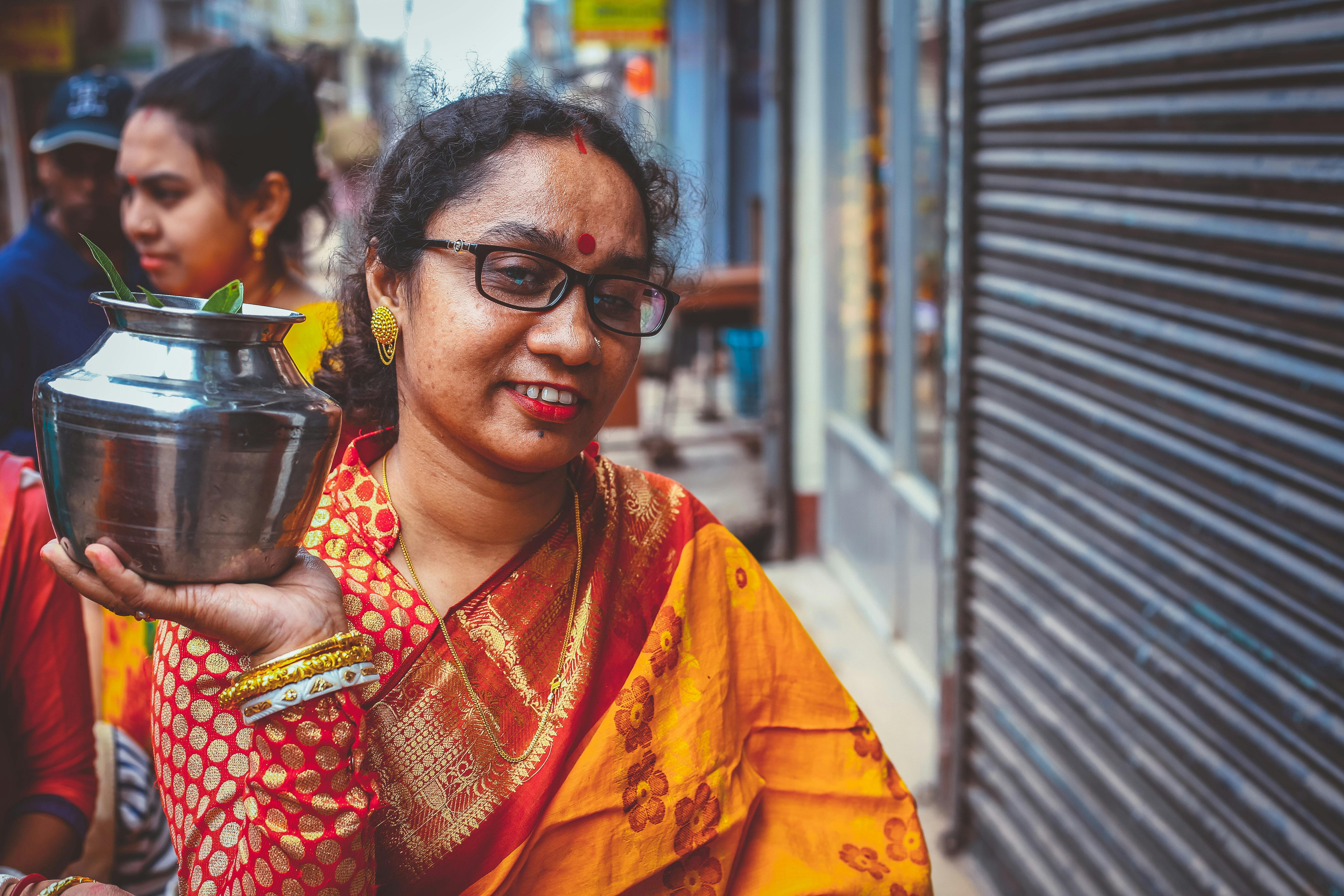 Woman Holding Stainless Pot · Free Stock Photo