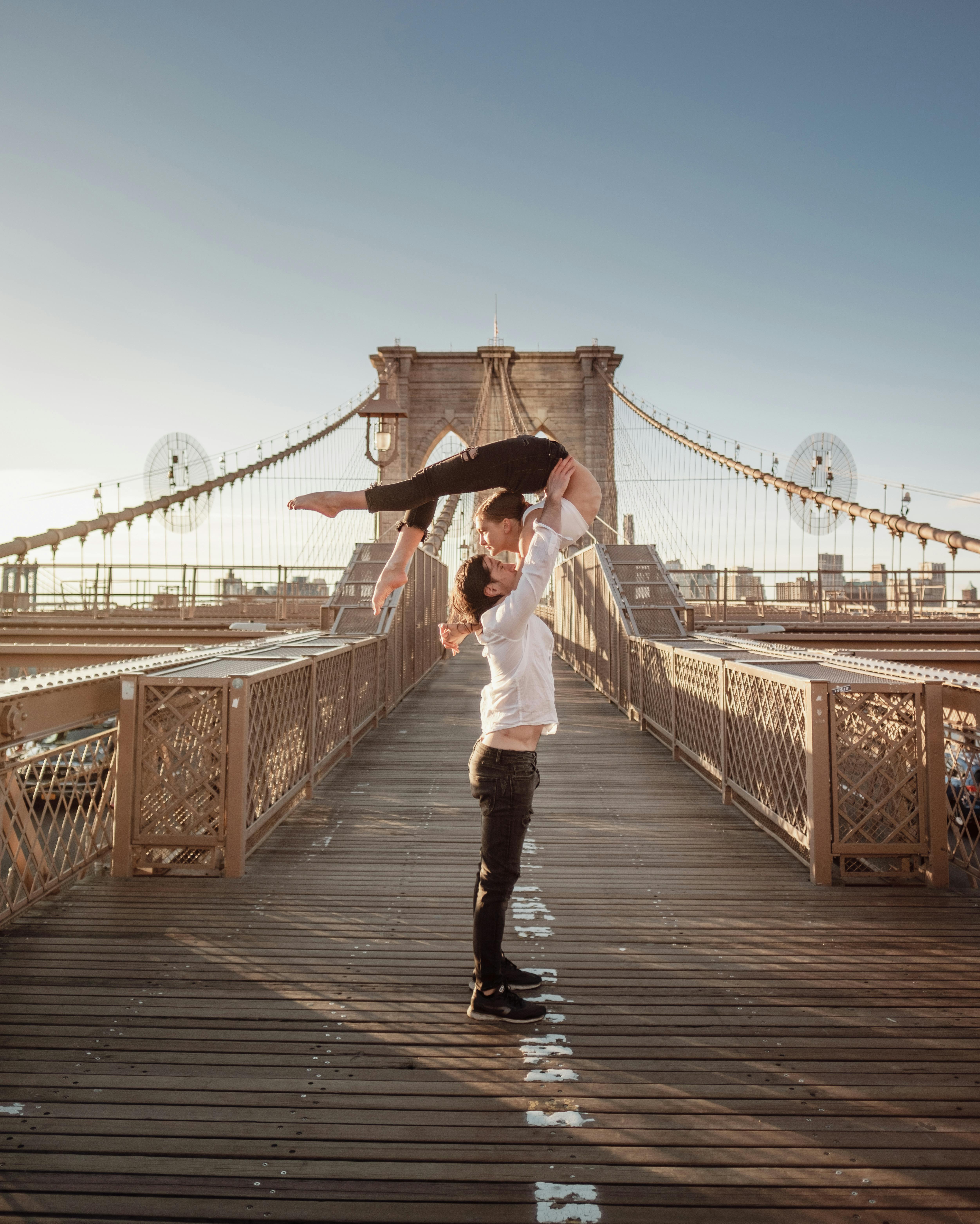 Couple Dancing on Bridge Overlooking Eiffel Tower · Free Stock Photo