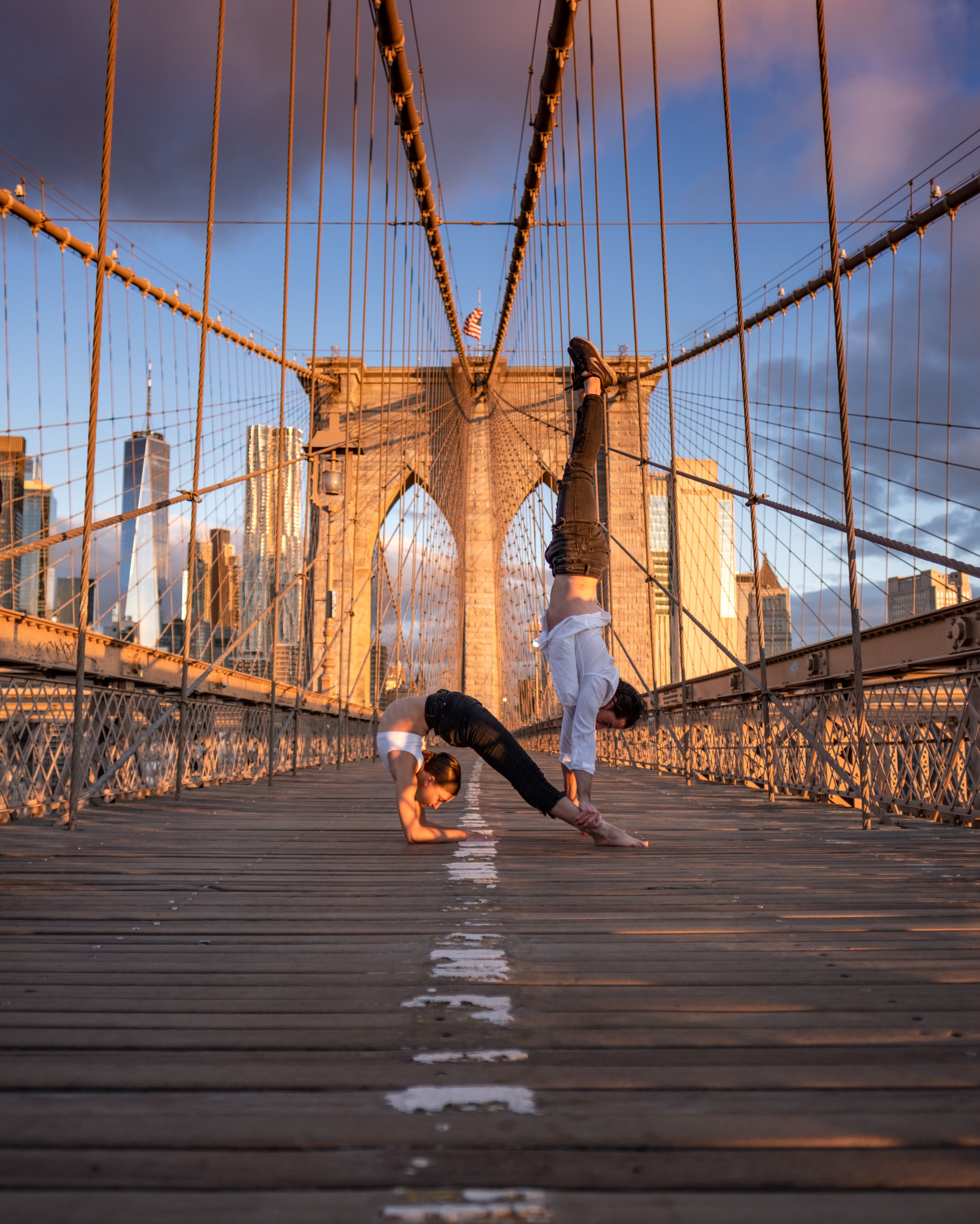 Couple of Gymnasts on Brooklyn Bridge · Free Stock Photo