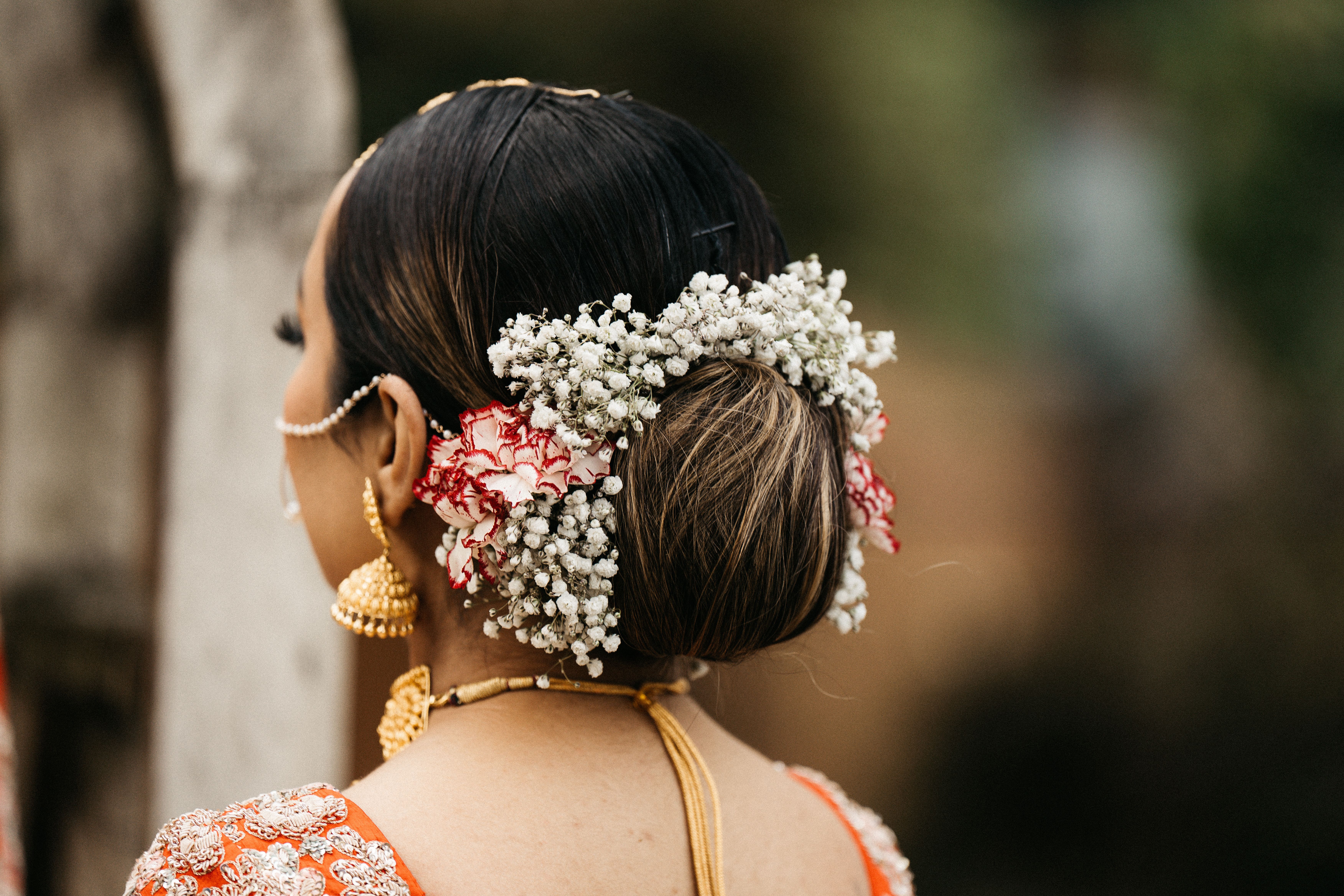 Back View of Woman with Flowers in Hair · Free Stock Photo