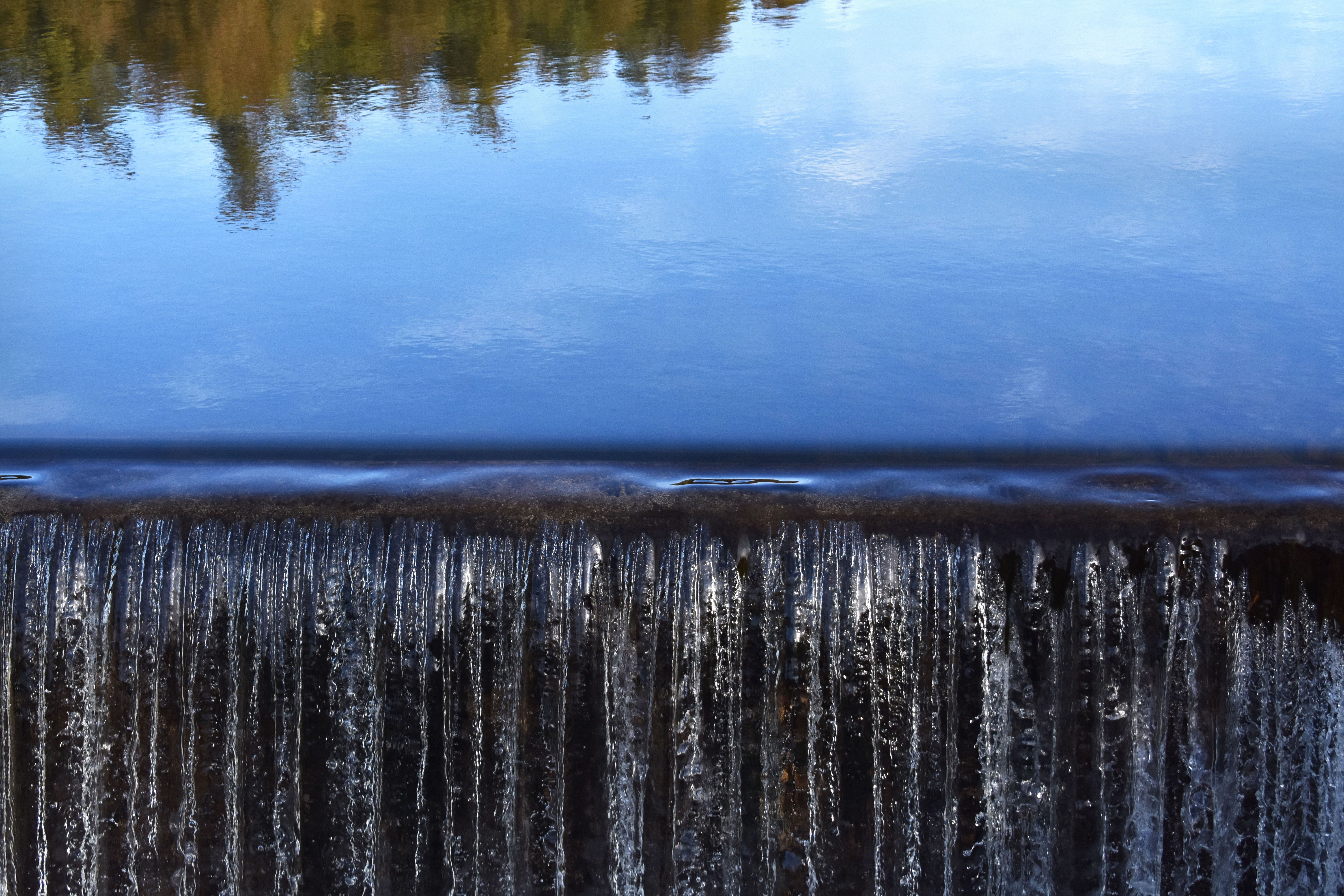 Flowing Cascade in Close-up View · Free Stock Photo