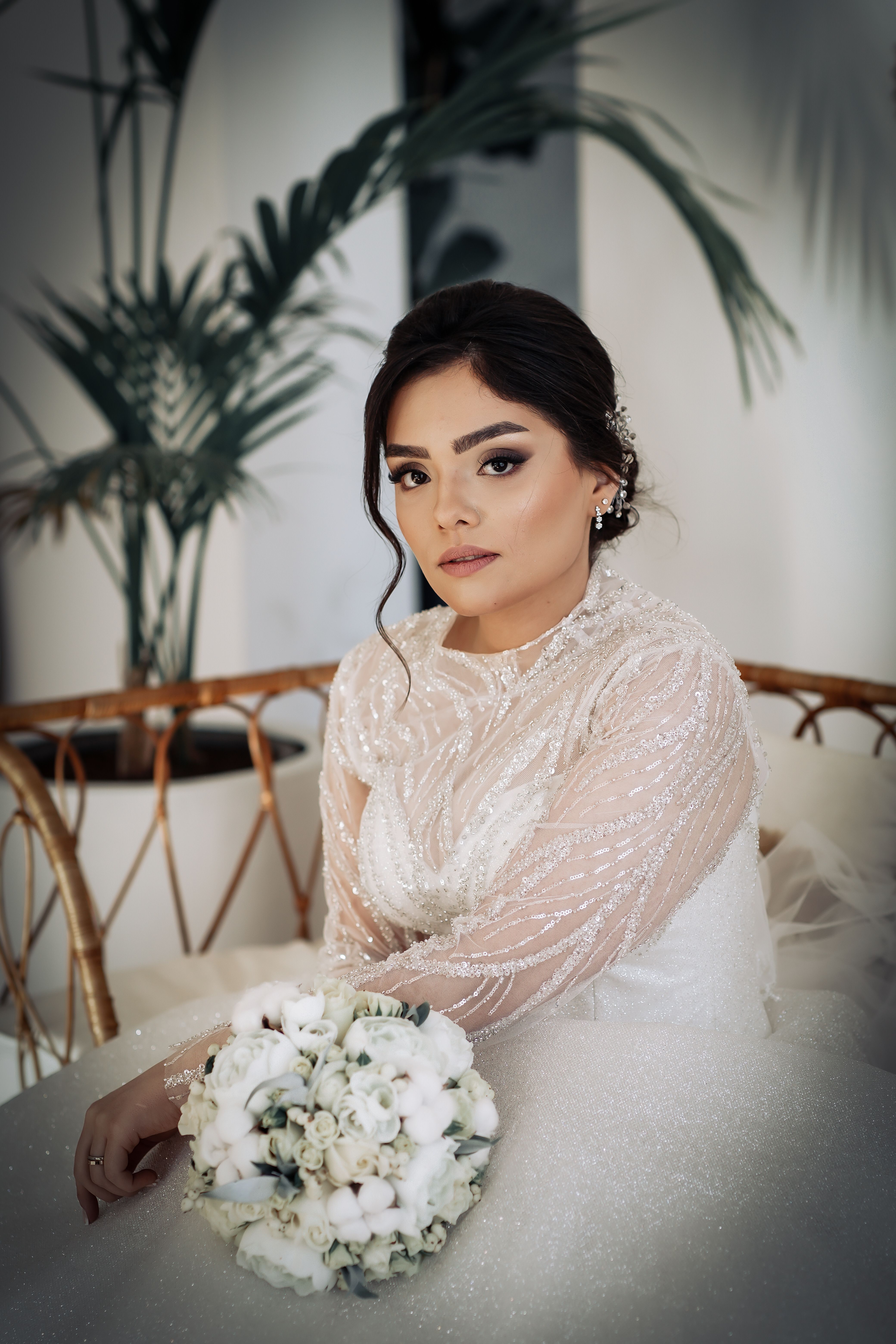 A Bride Sitting with a Bouquet · Free Stock Photo