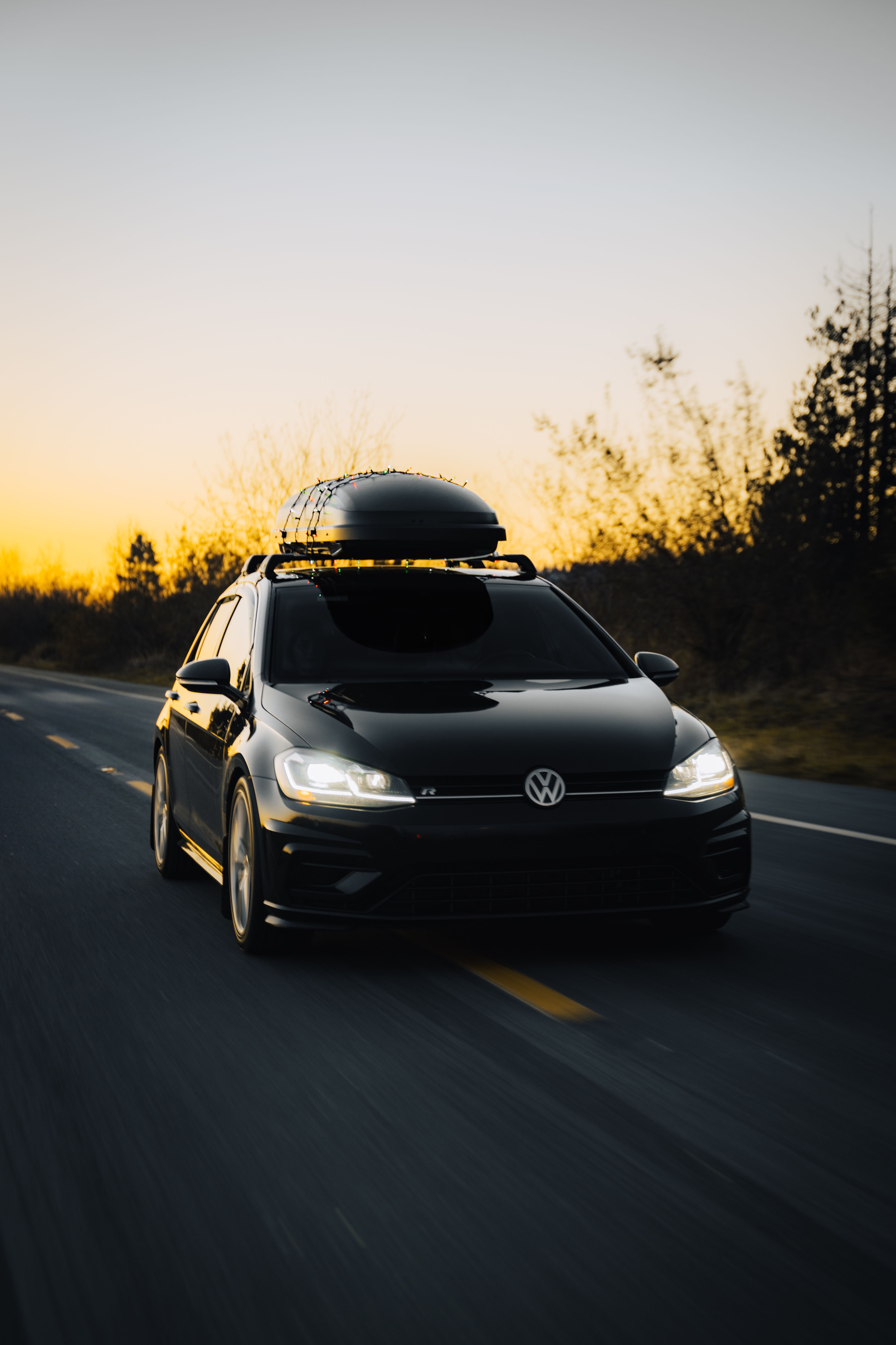 A Modern Volkswagen Car on the Street at Sunset · Free Stock Photo