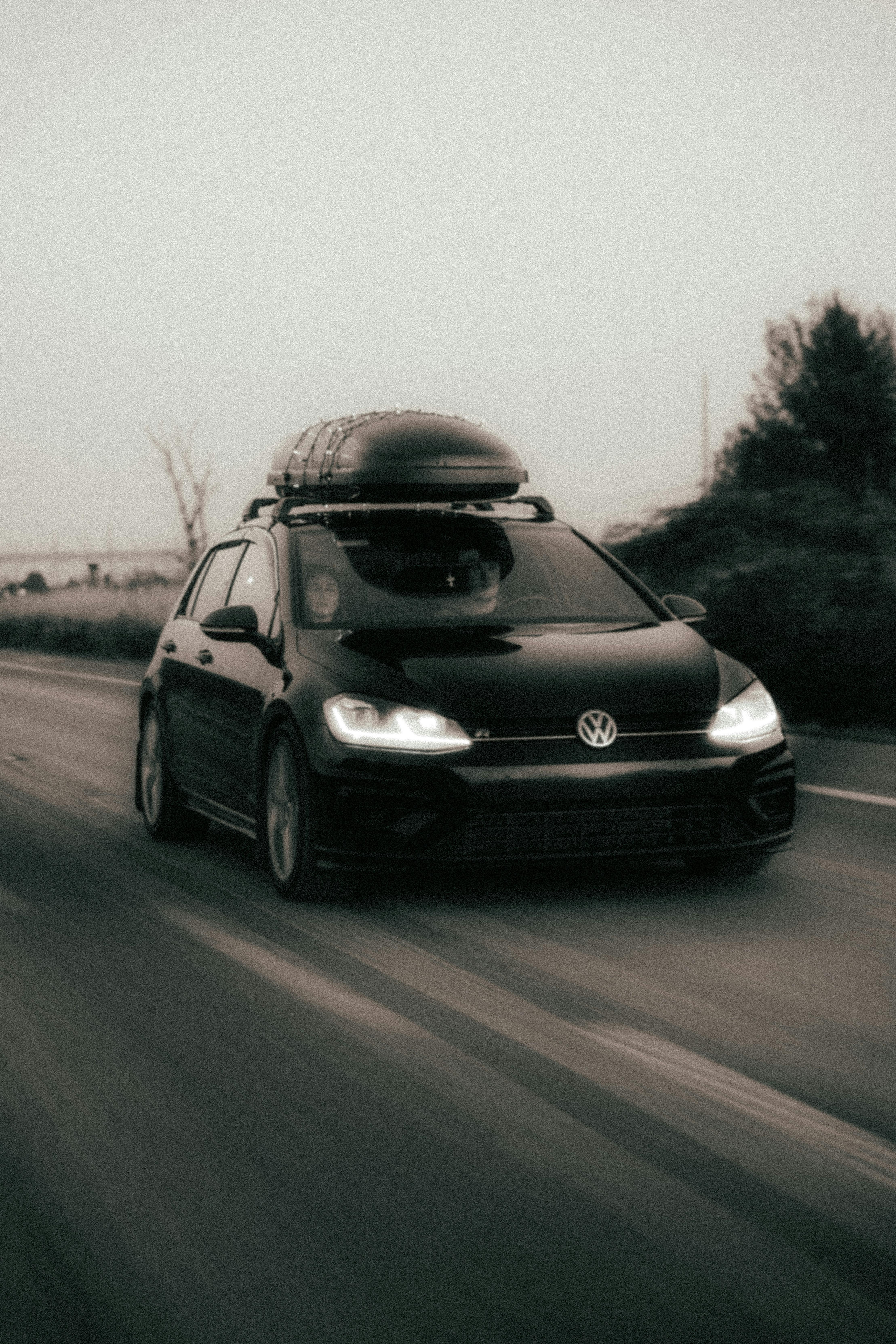 Black Volkswagen Golf on Road · Free Stock Photo