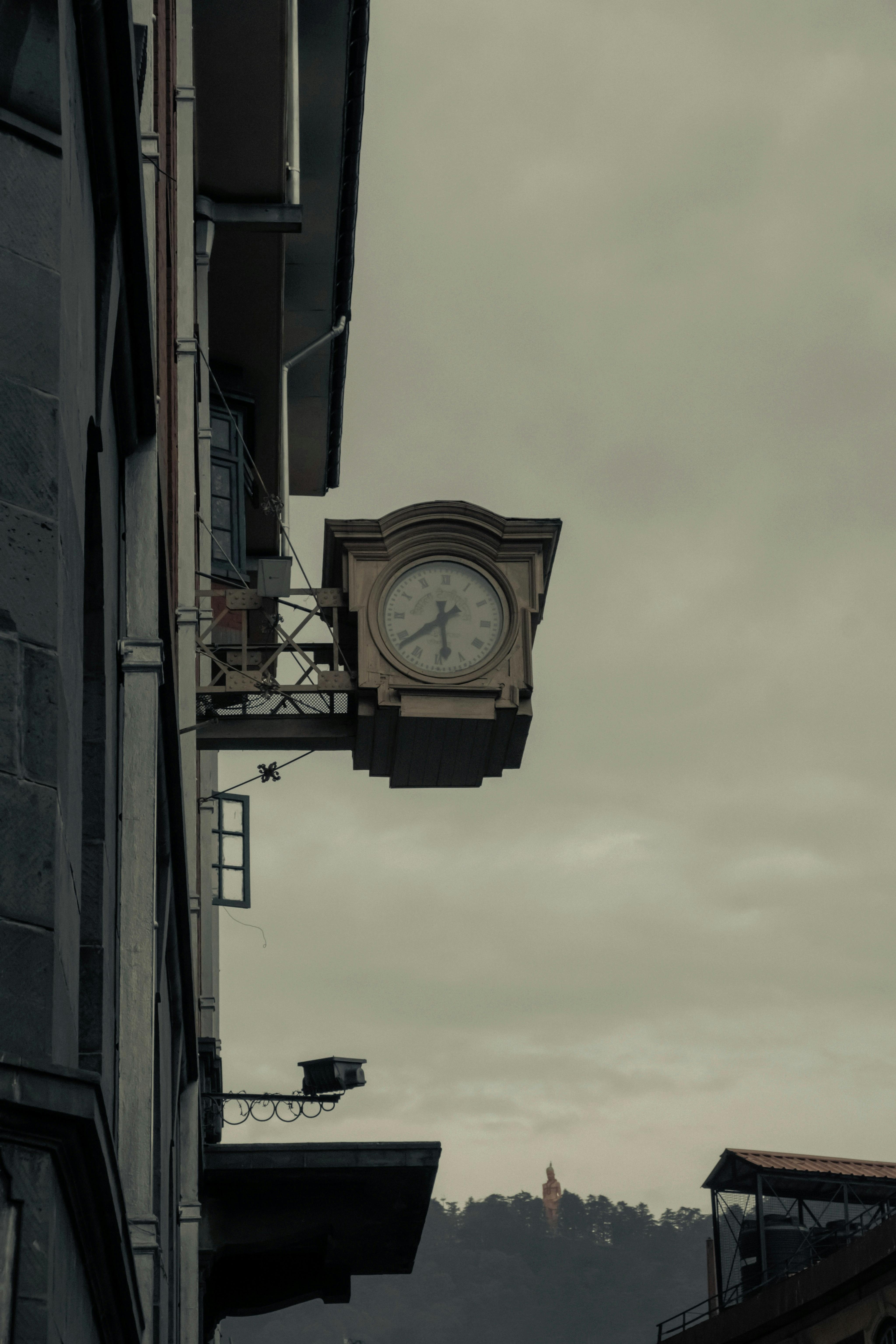 Clock on Building Wall · Free Stock Photo