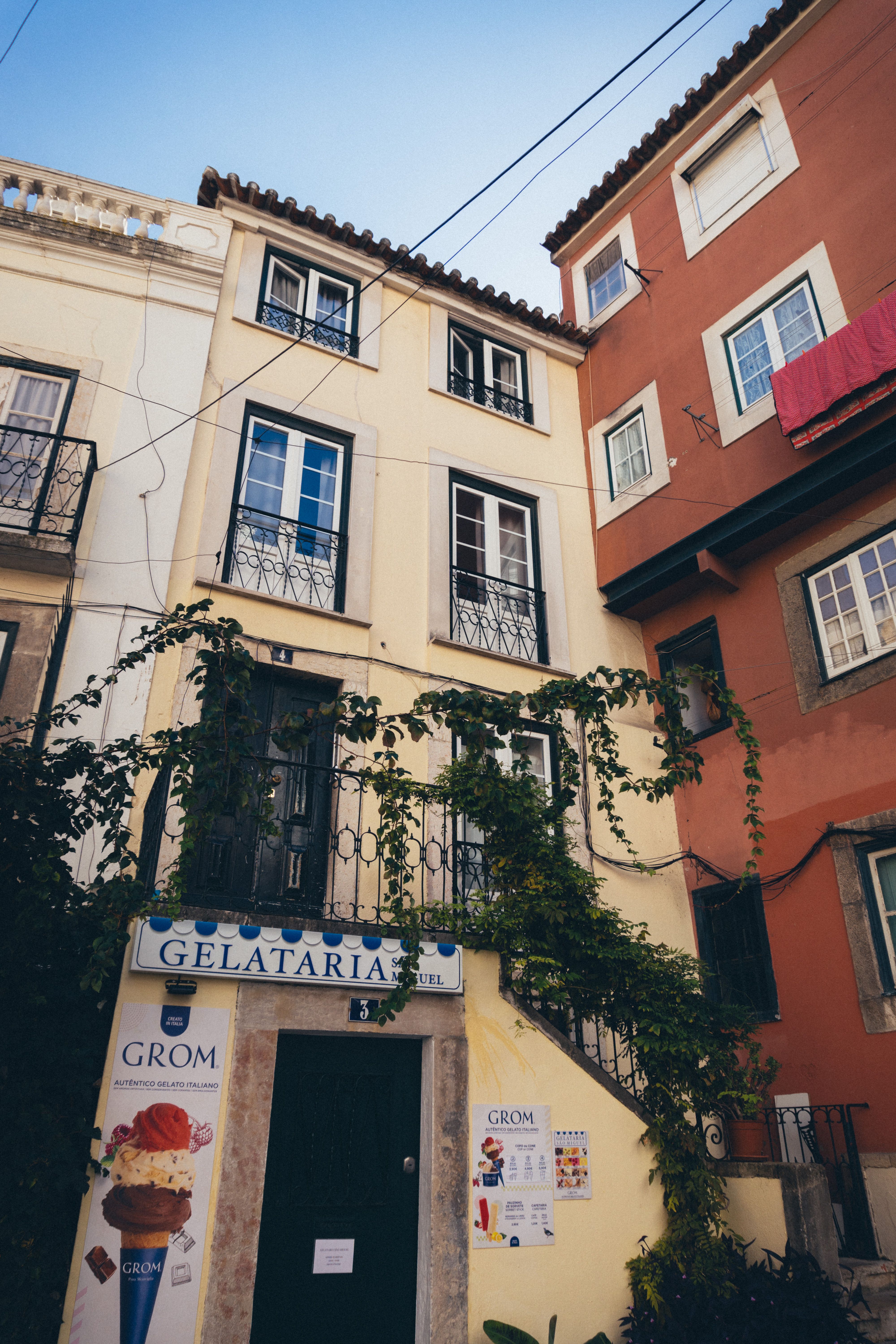 Facade of Colorful Building with an Ice Cream Shop in City · Free Stock ...