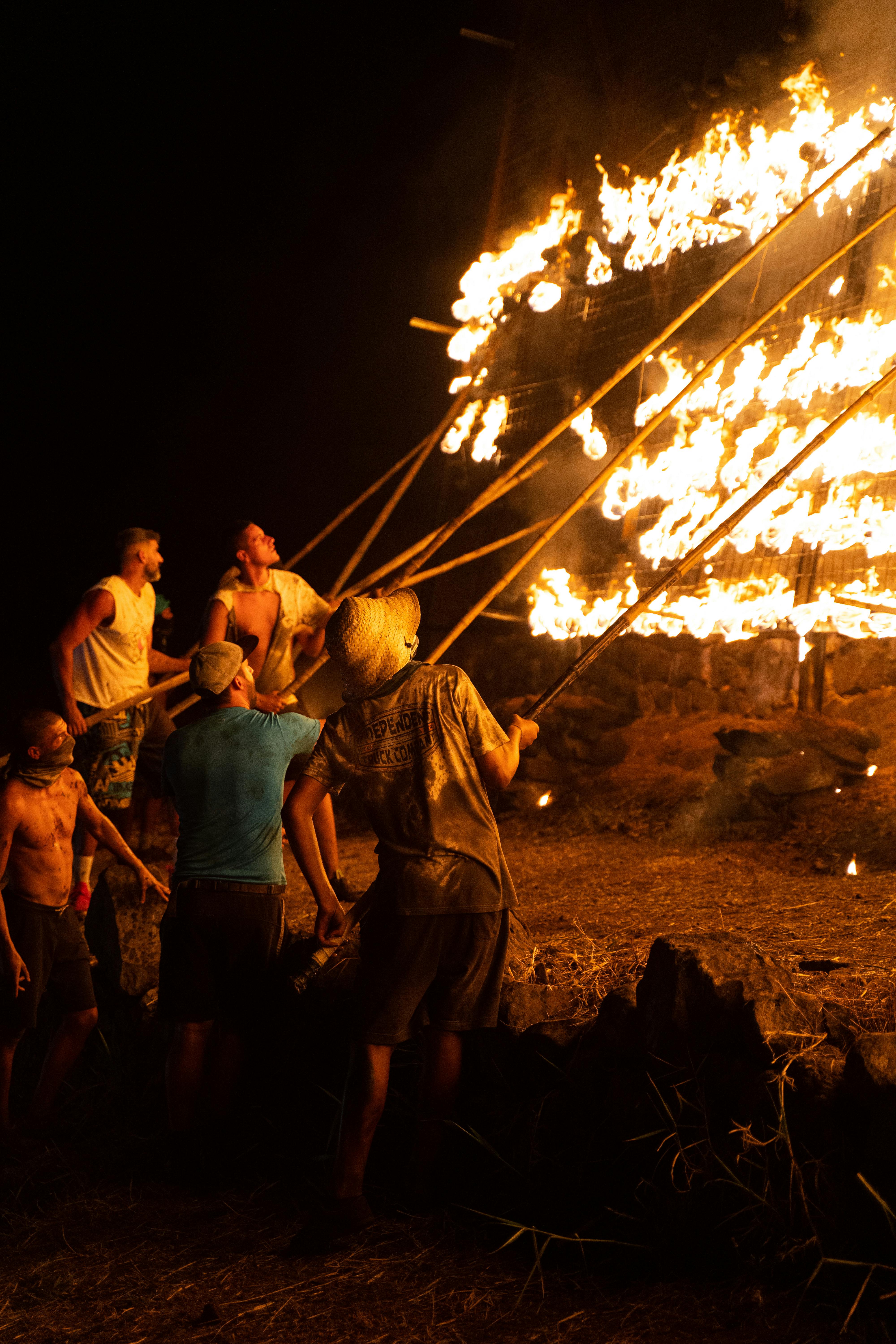 Men Standing near a Burning Building · Free Stock Photo