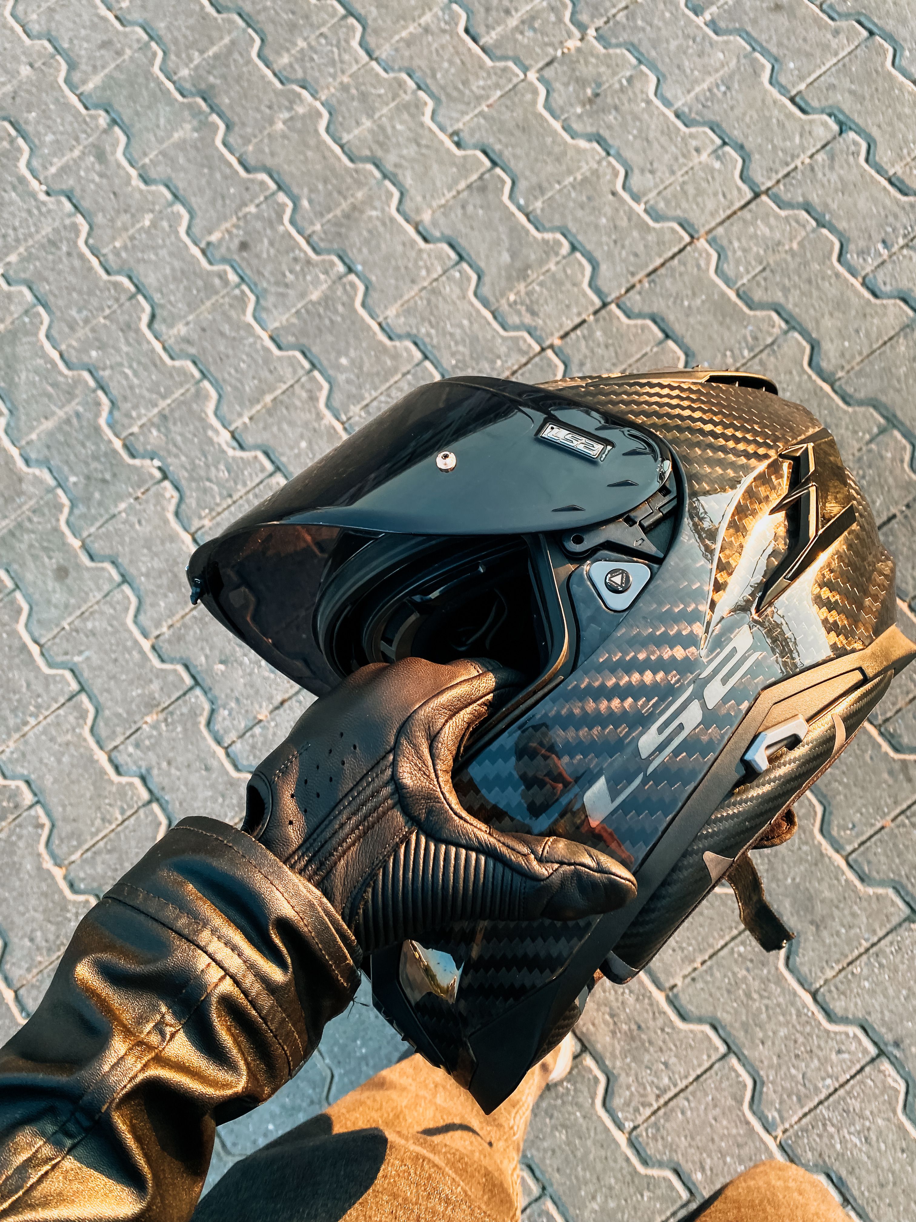 Hand Holding Bikers Helmet · Free Stock Photo