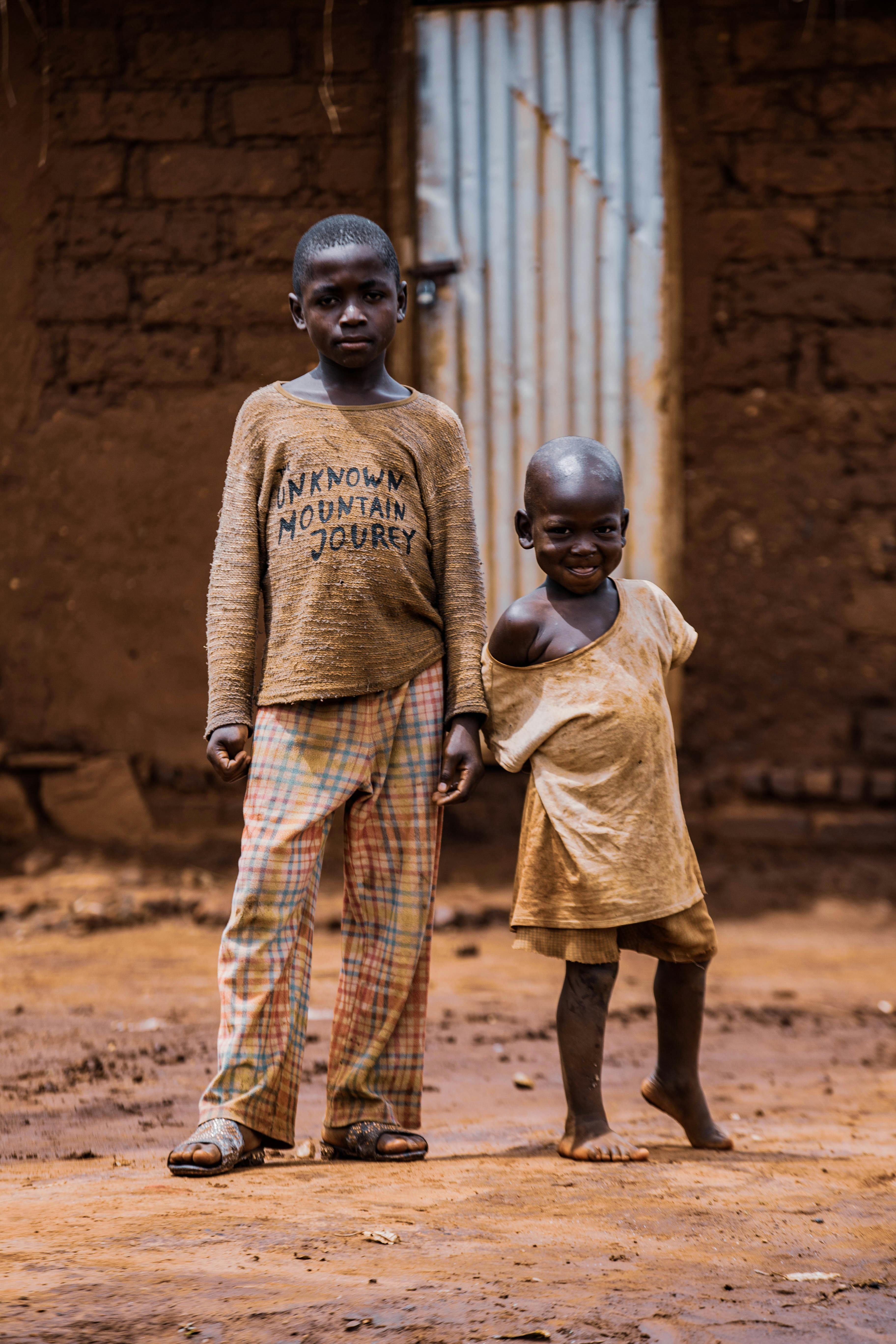Smiling Brothers Standing Together · Free Stock Photo