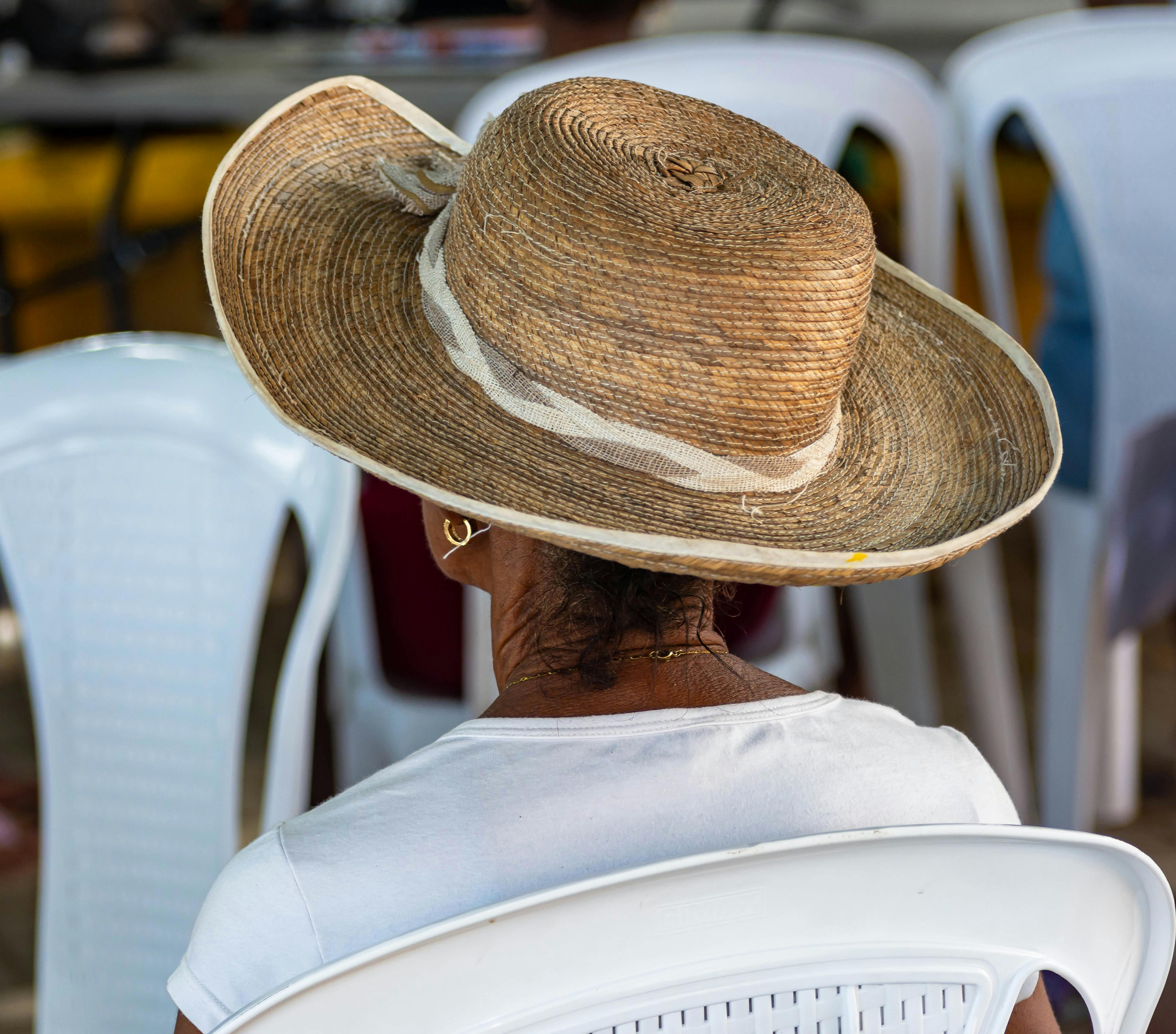 Woman Wearing a Straw Hat · Free Stock Photo