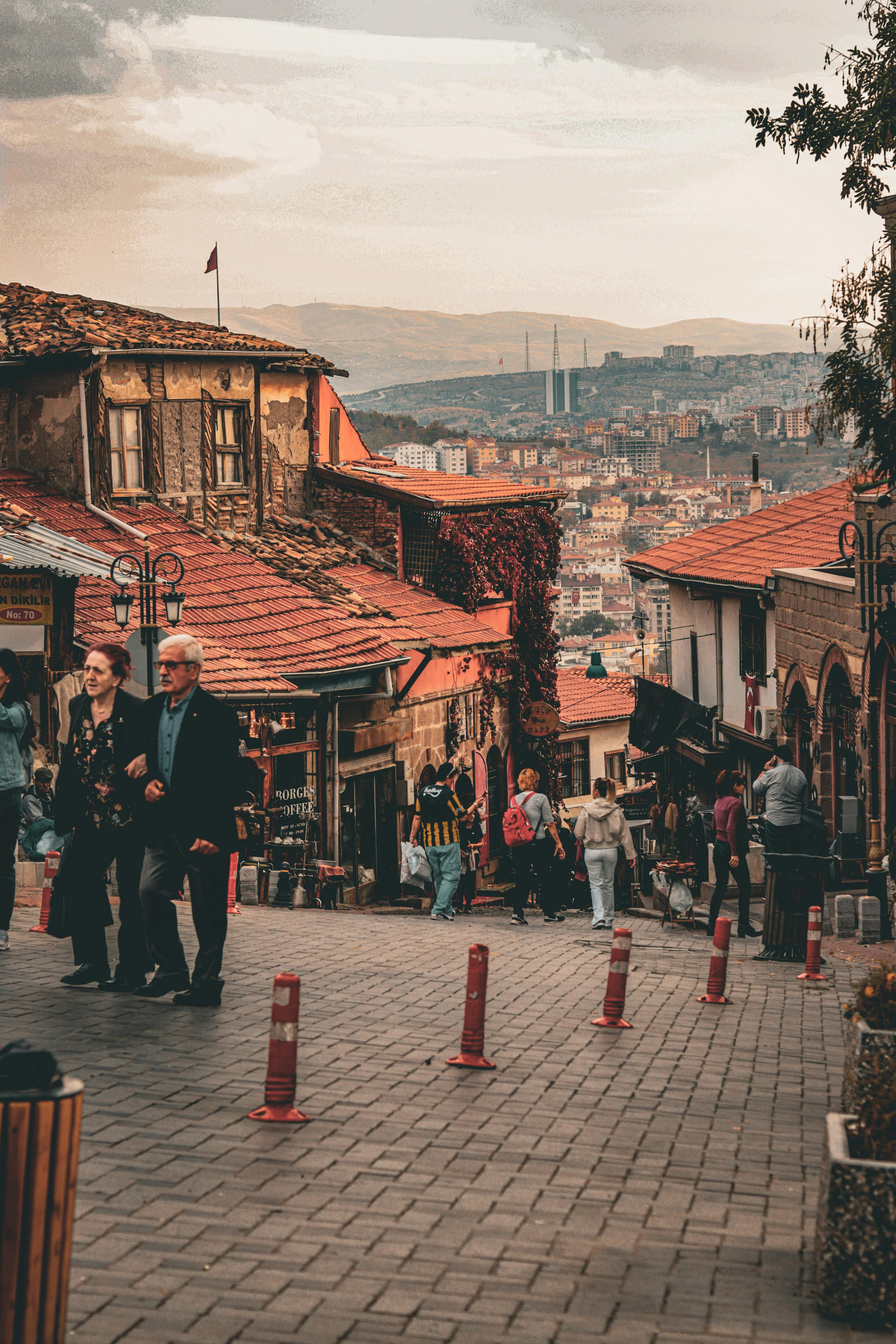 Pedestrians Walking in an Old Town · Free Stock Photo