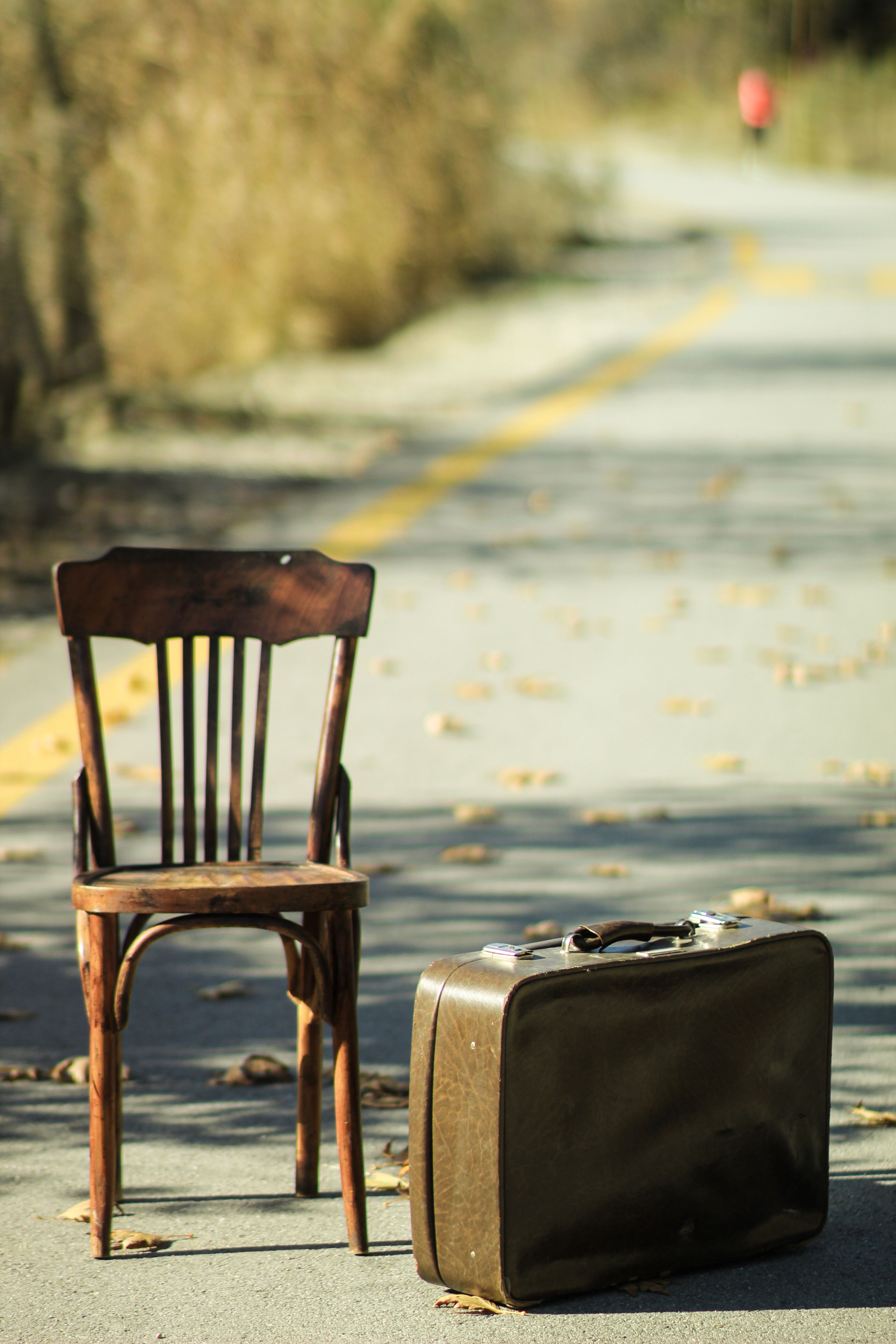 Chair and Suitcase on the Street · Free Stock Photo