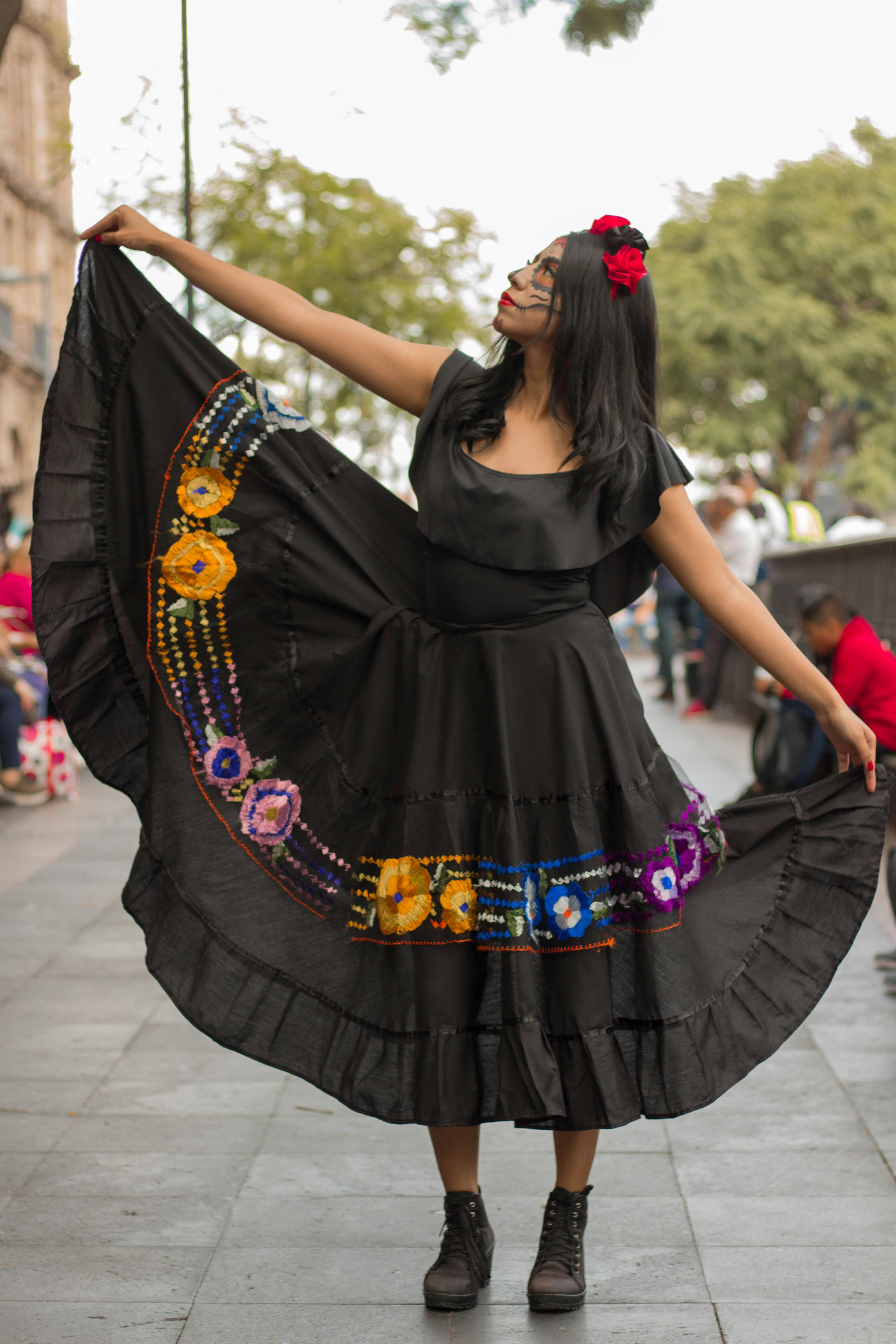 Woman with Sugar Skull Makeup Standing on Sidewalk · Free Stock Photo