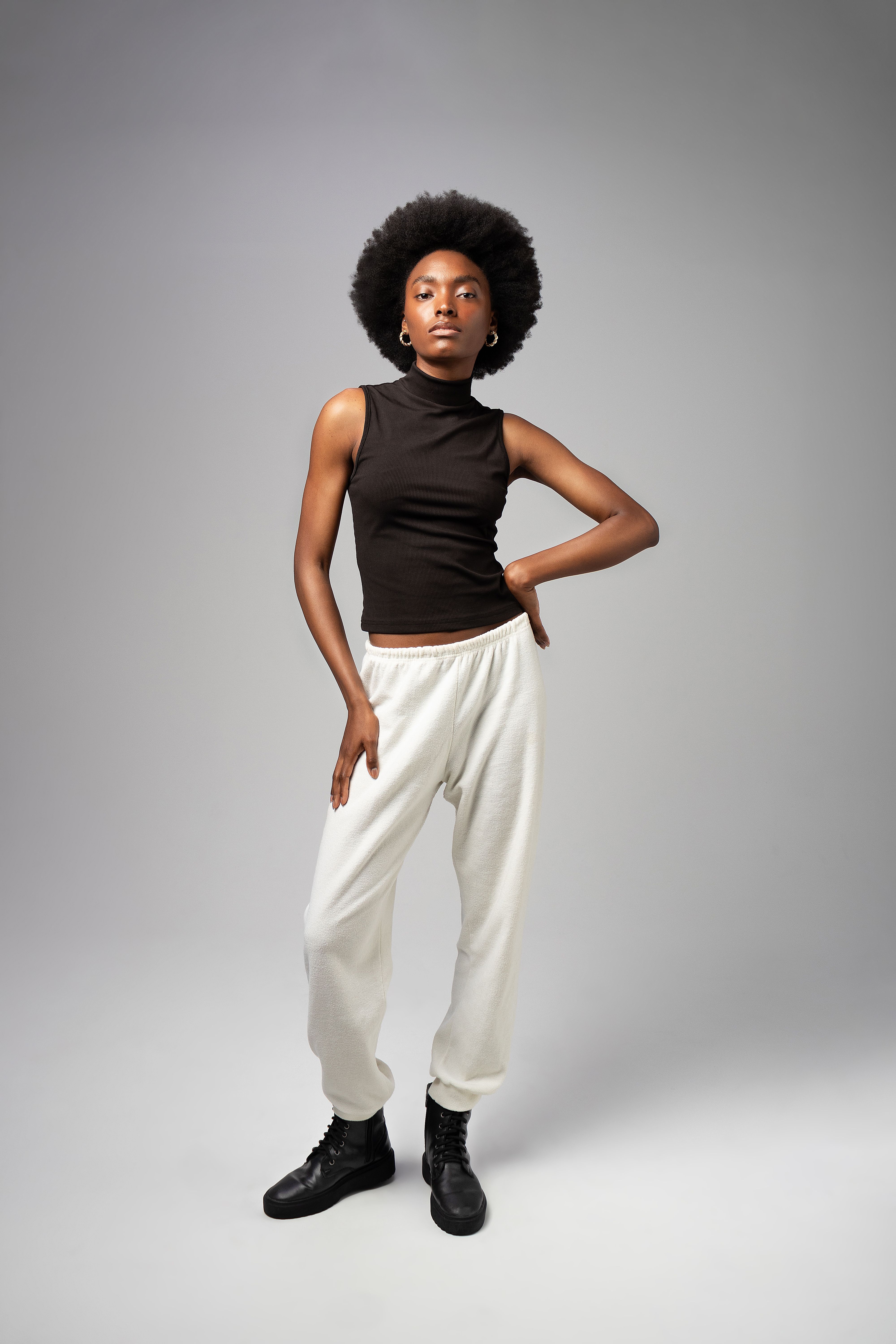 Model Standing on Gray Backgroun · Free Stock Photo