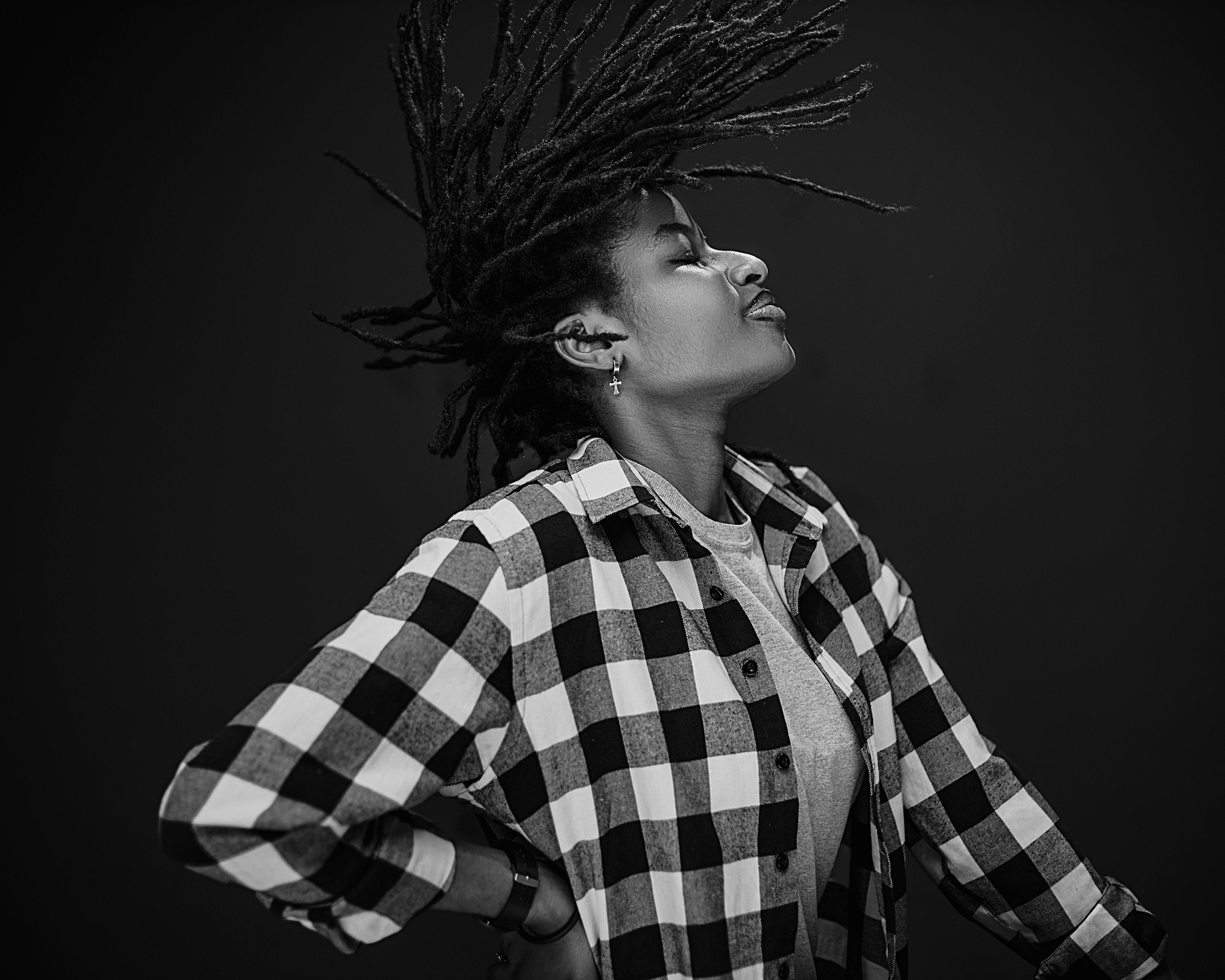 Model with Dreadlocks Tossing Hair · Free Stock Photo