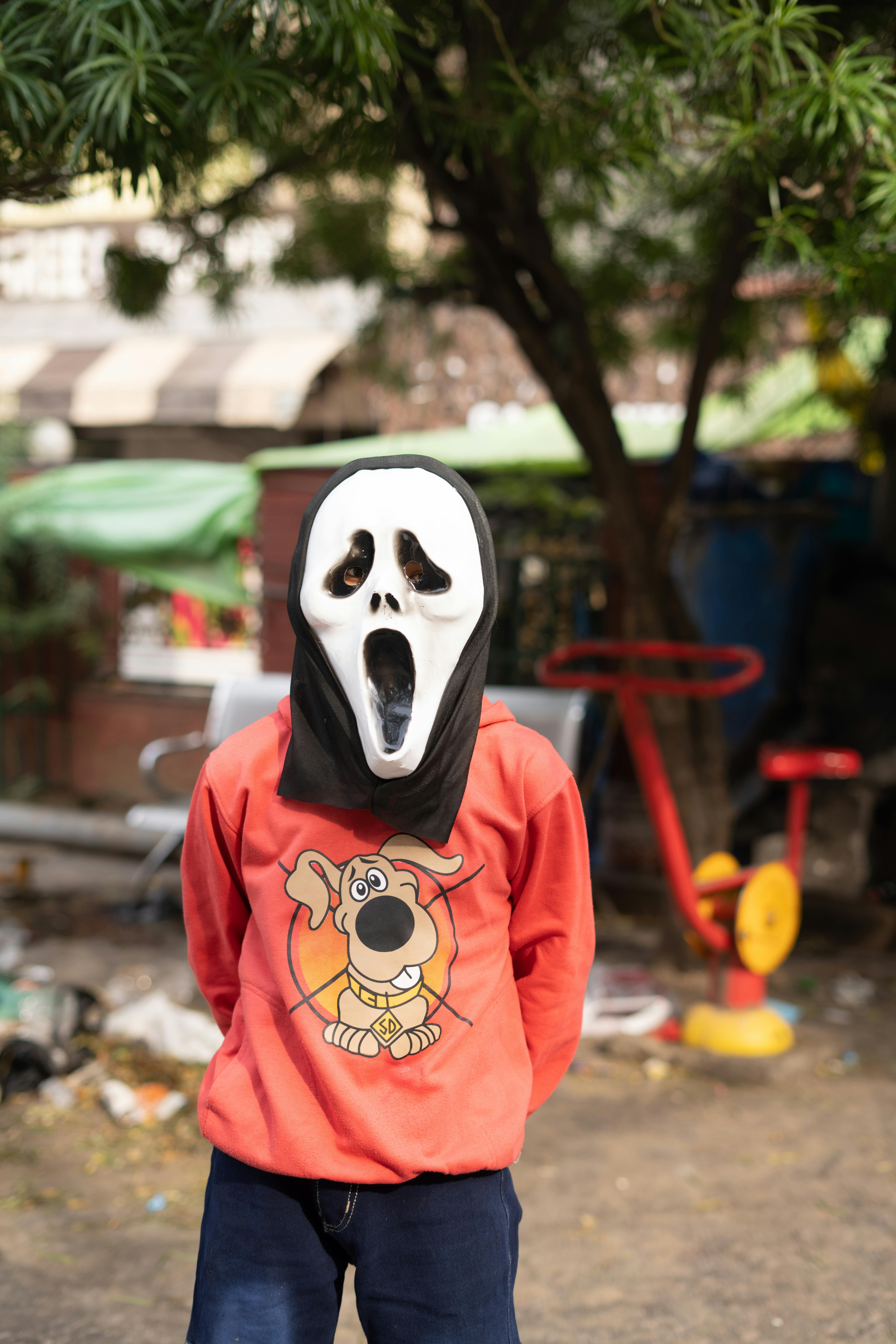 A Kid Wearing a Mask · Free Stock Photo