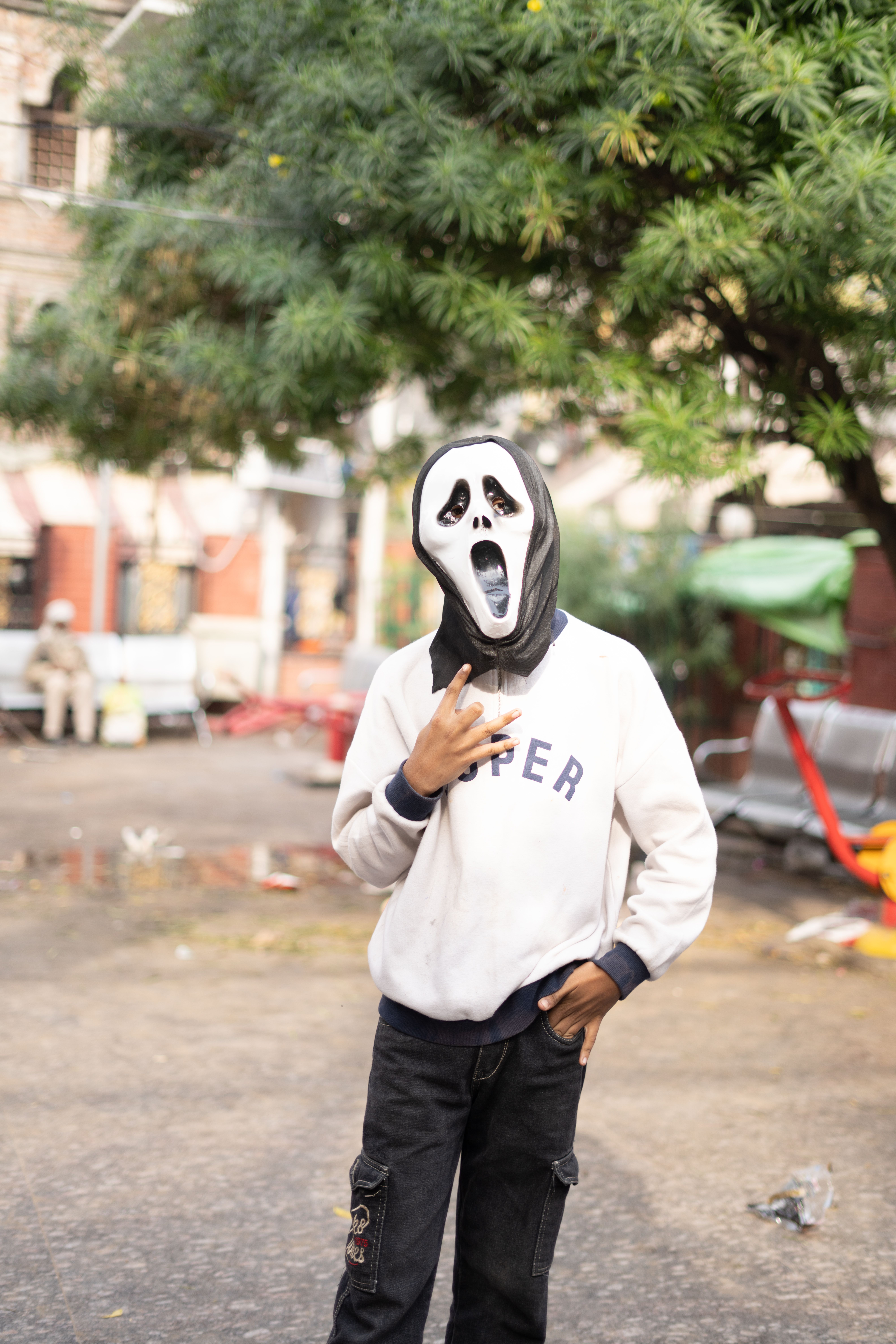 Man Standing in Scream Mask · Free Stock Photo