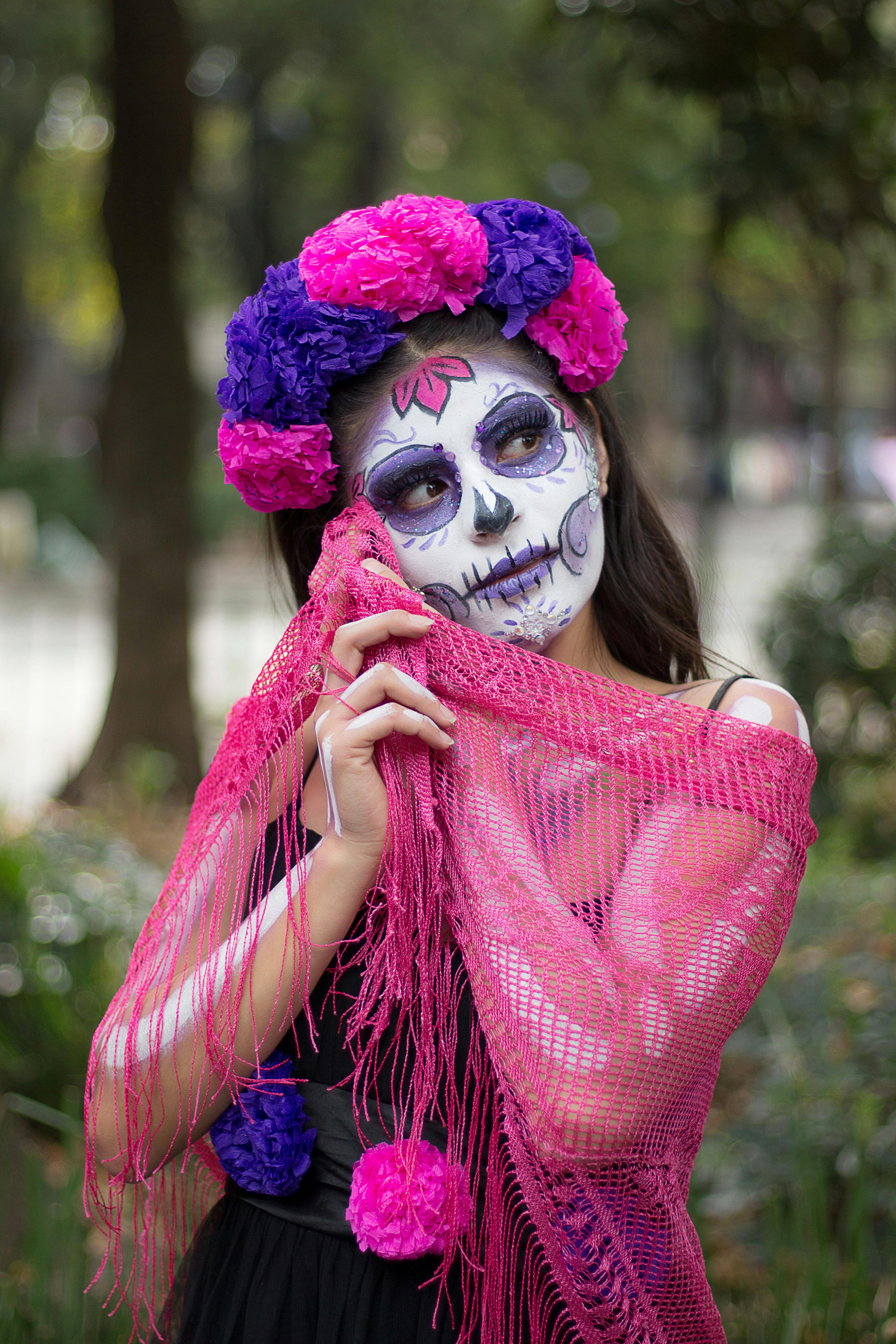 Woman Dressed as a Catrina Posing Outside · Free Stock Photo