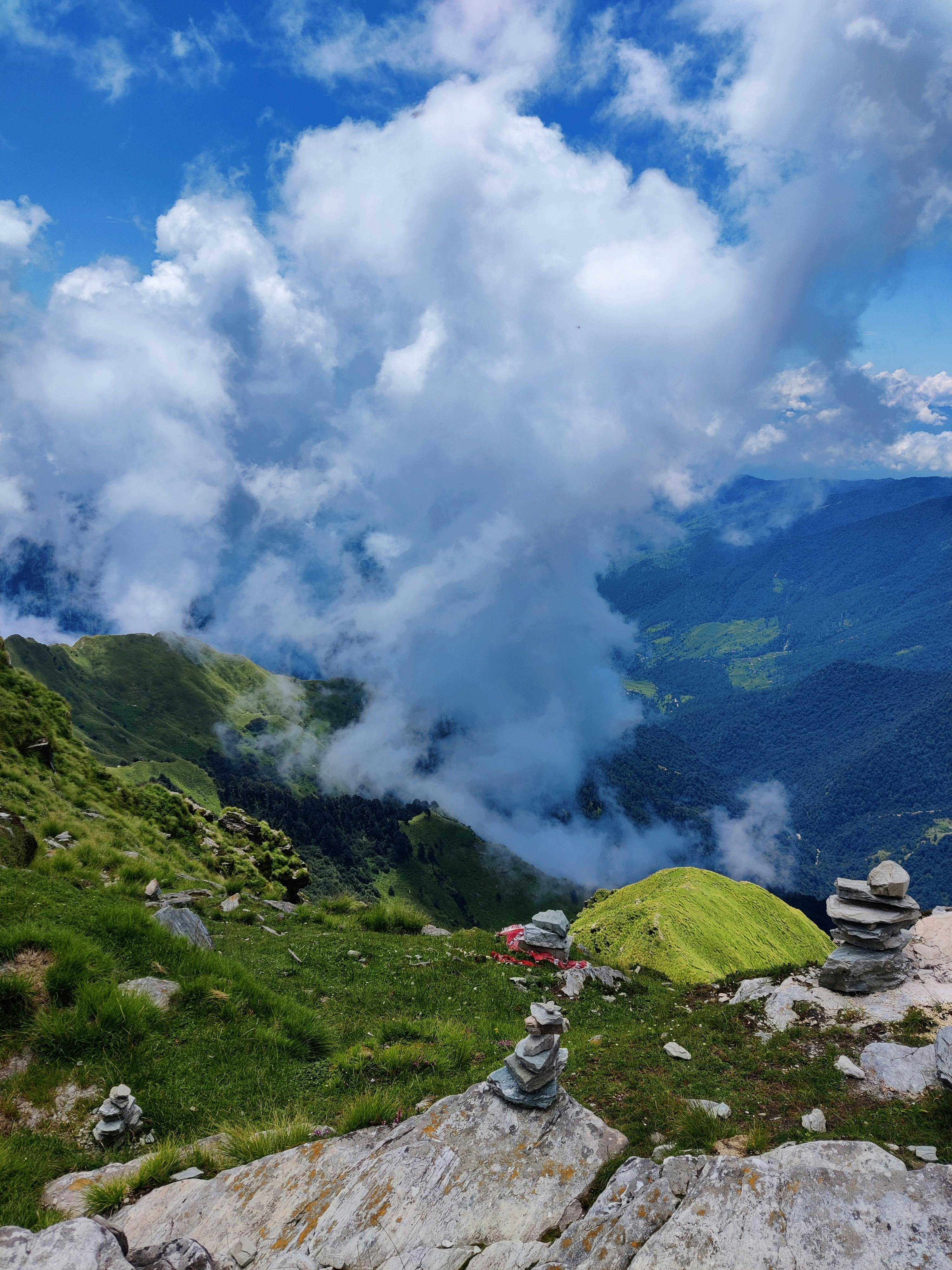 Small Mountaintop Cairns with Low Clouds in the Background · Free Stock ...